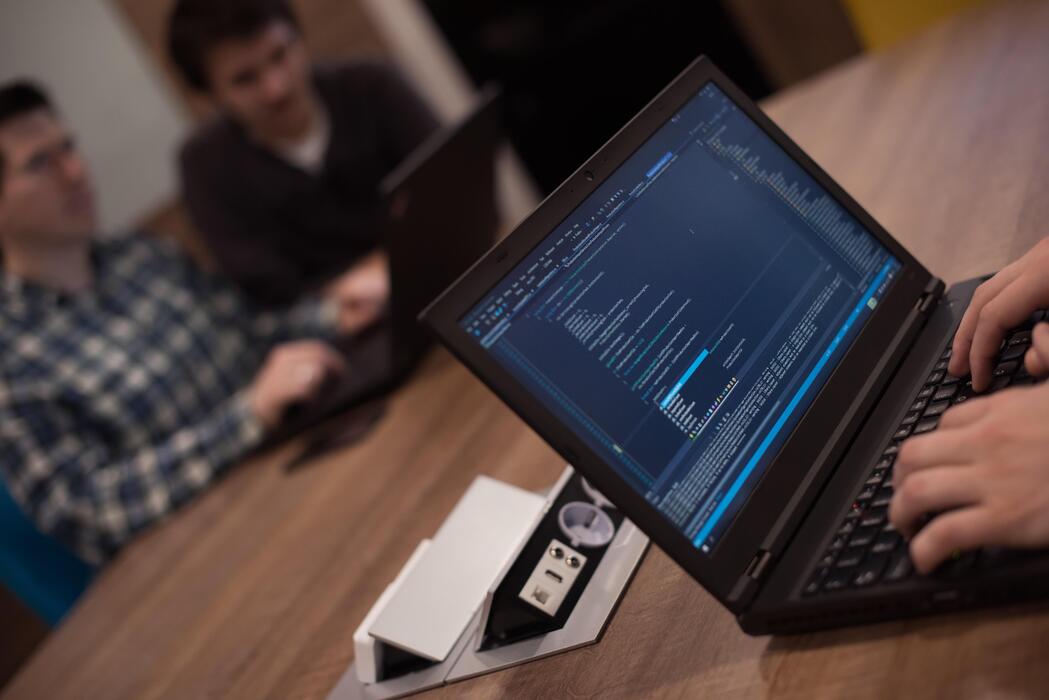 Programmer Laptop Stock Photos, Images and Backgrounds for Free Download