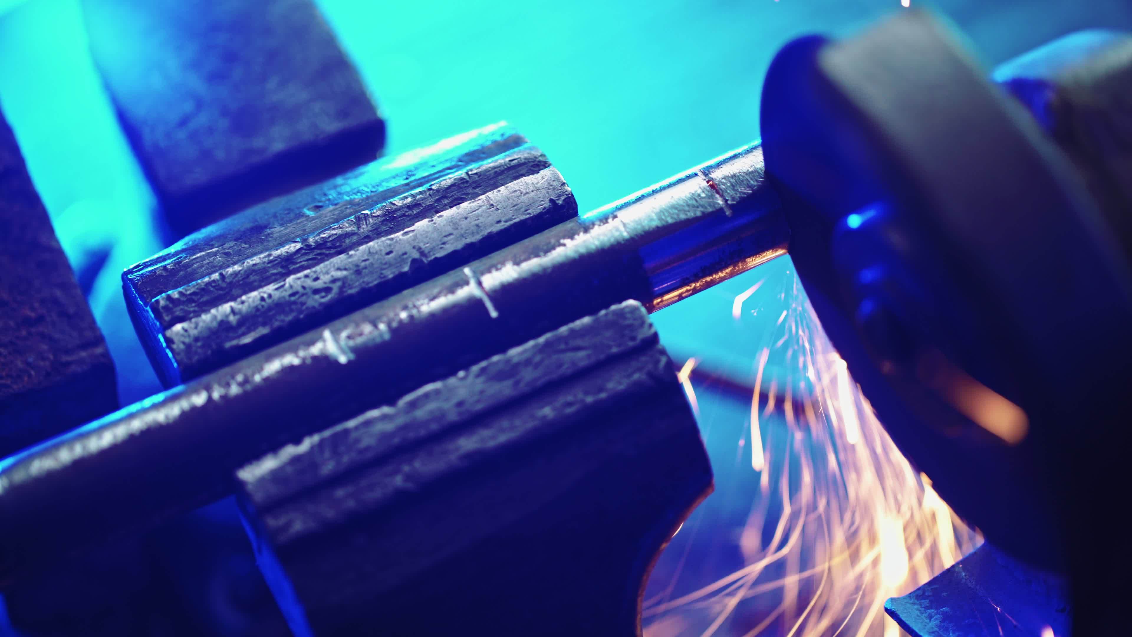 Professional Mechanic Cuts Off Metal Pipe With A Grinder Man Works Professional Mechanic Cuts Off Metal Pipe With A Grinder Man Works