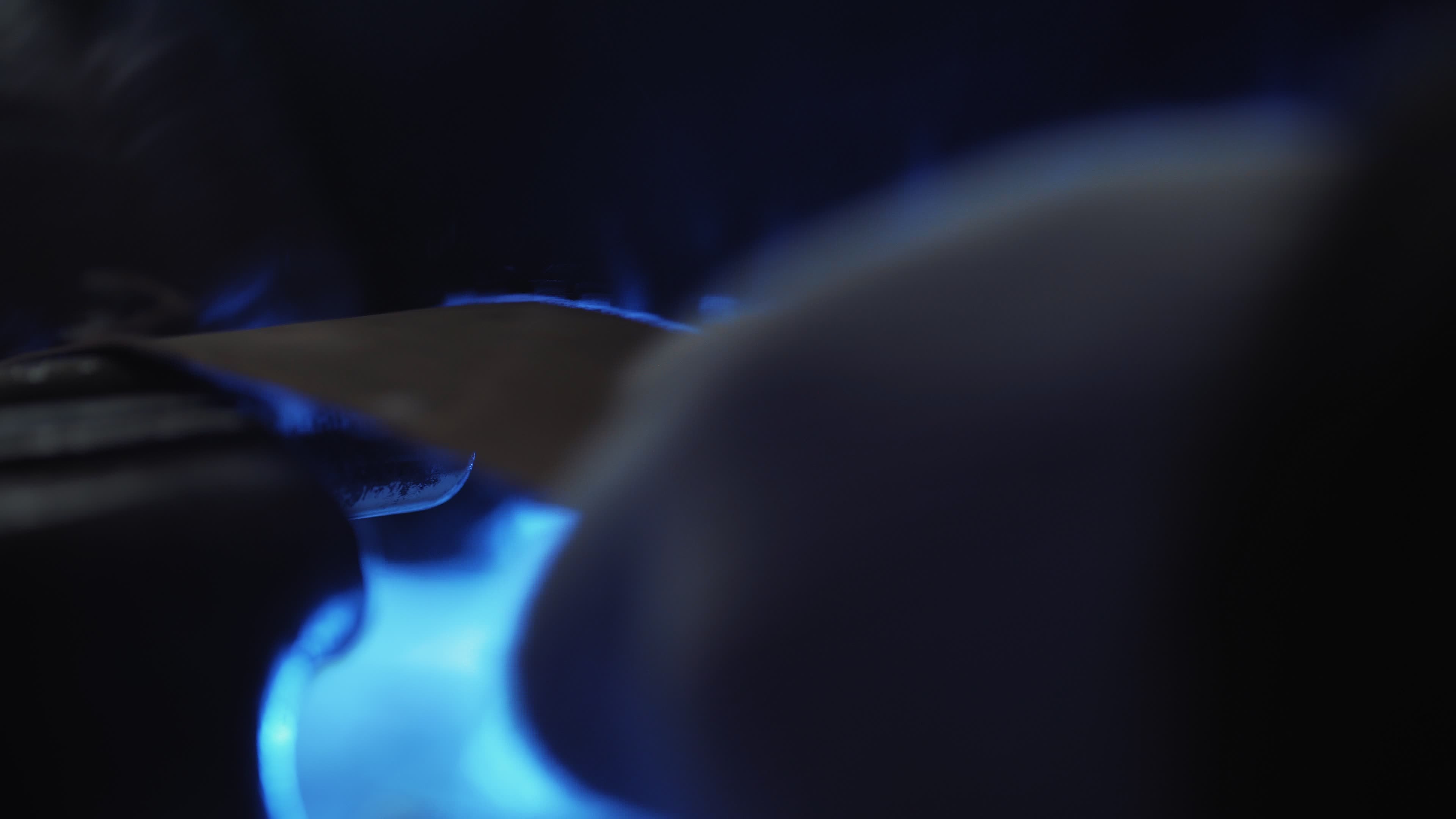 Rasp File Held In Gloved Hands Is Used To Smooth The Rough Edges On A Silver Metal Pipe Being