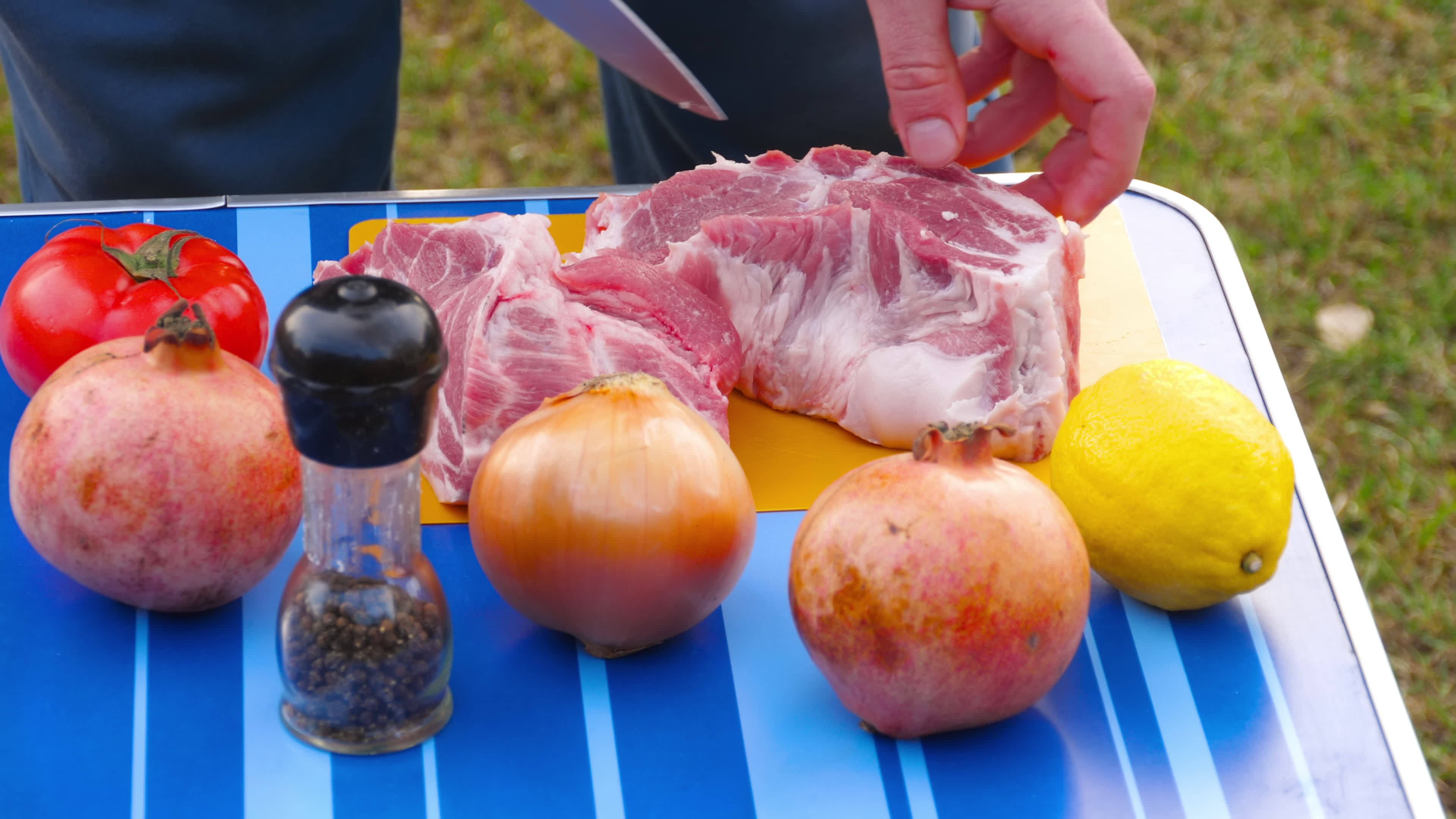 Faceless Man Cuts Meat For Grill In Nature Grilling Meat Pork Shashlik Man Preparing Grilled