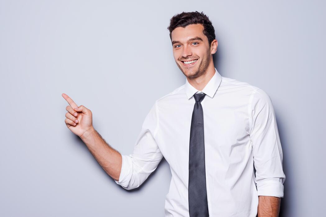 Man Pointing Stock Photos, Images and Backgrounds for Free Download