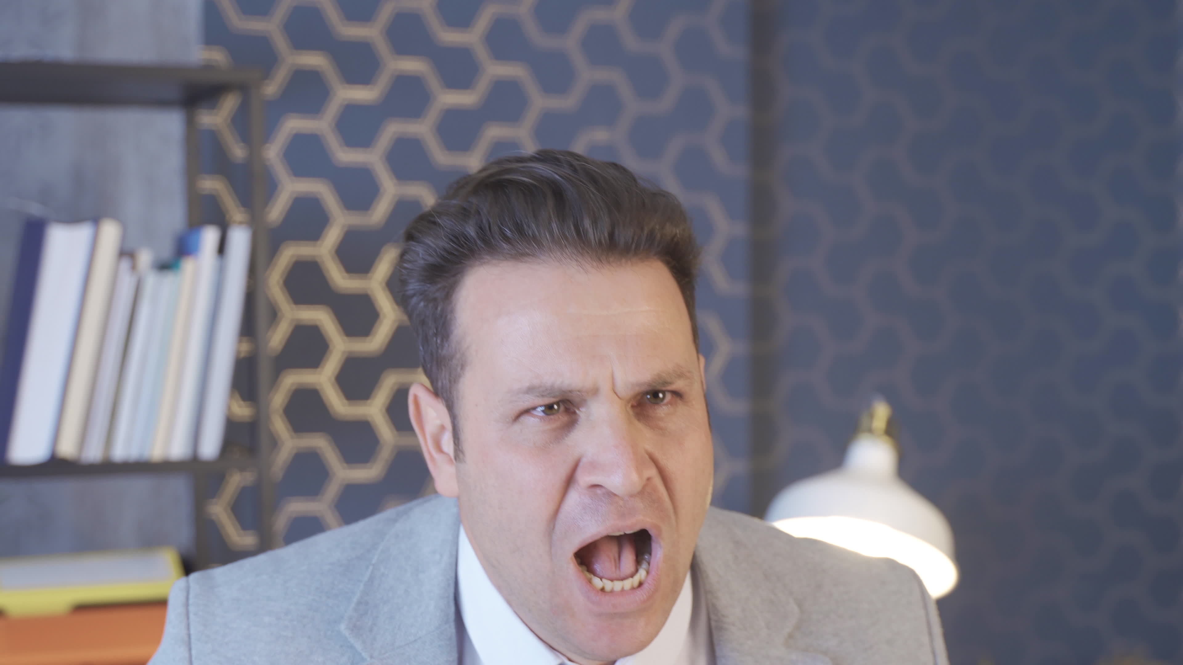 Office worker having a nervous breakdown. Businessman yelling. Office ...