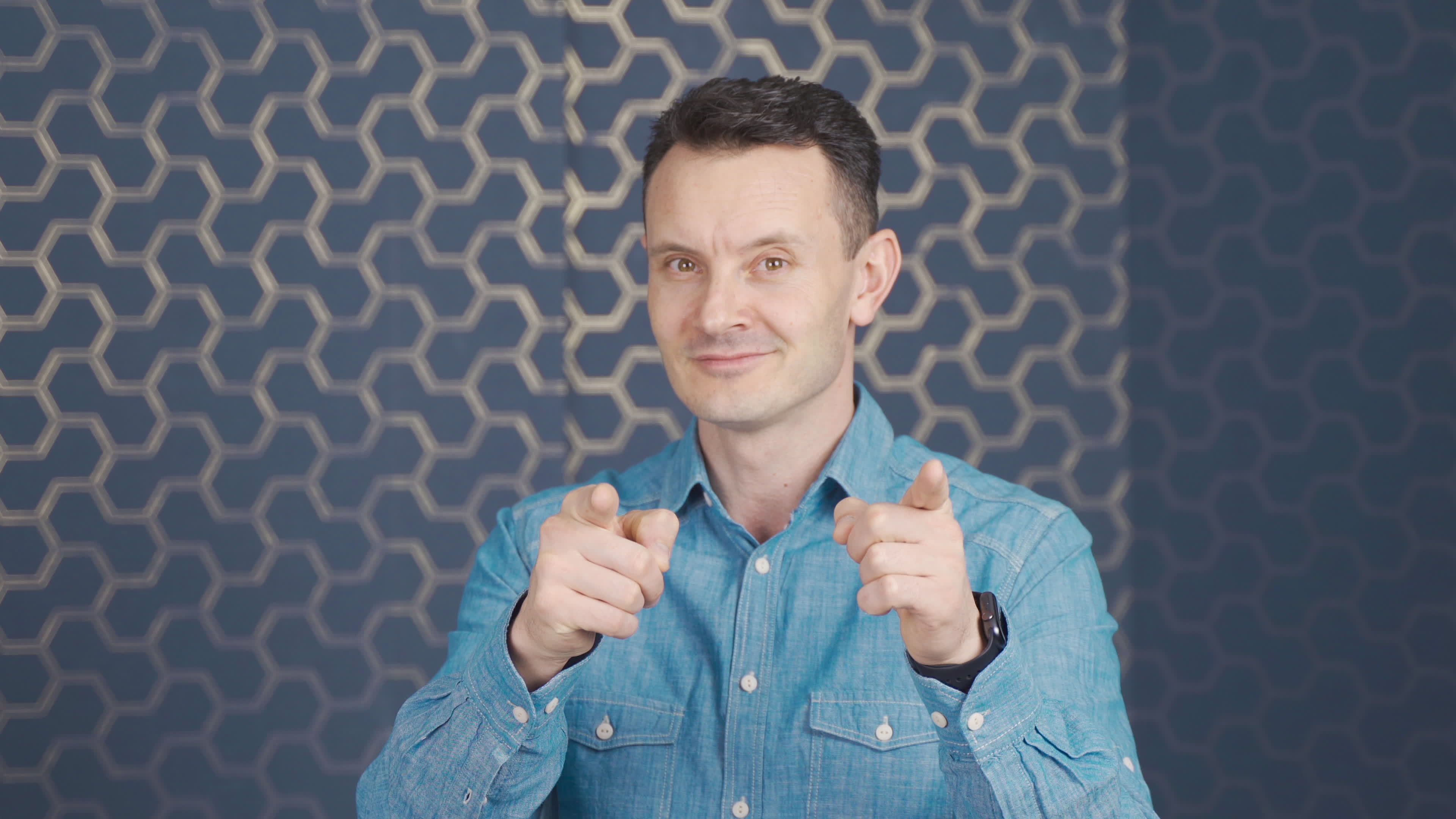 Man pointing fingers at camera. Man pointing at camera using index ...