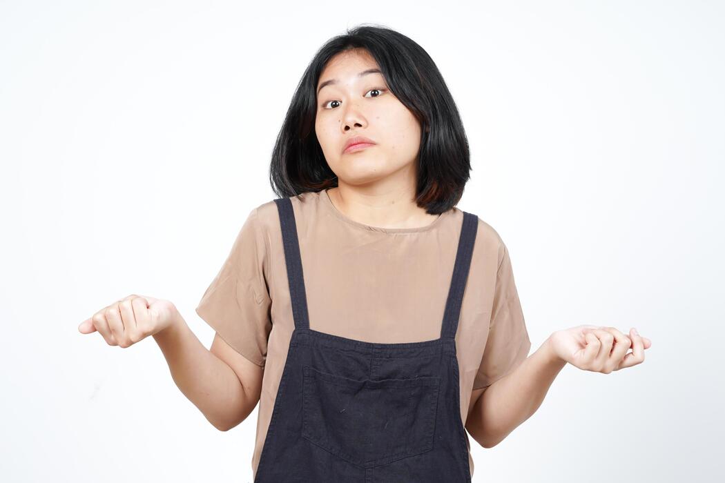 Asian Woman Confuse Stock Photos, Images and Backgrounds for Free Download