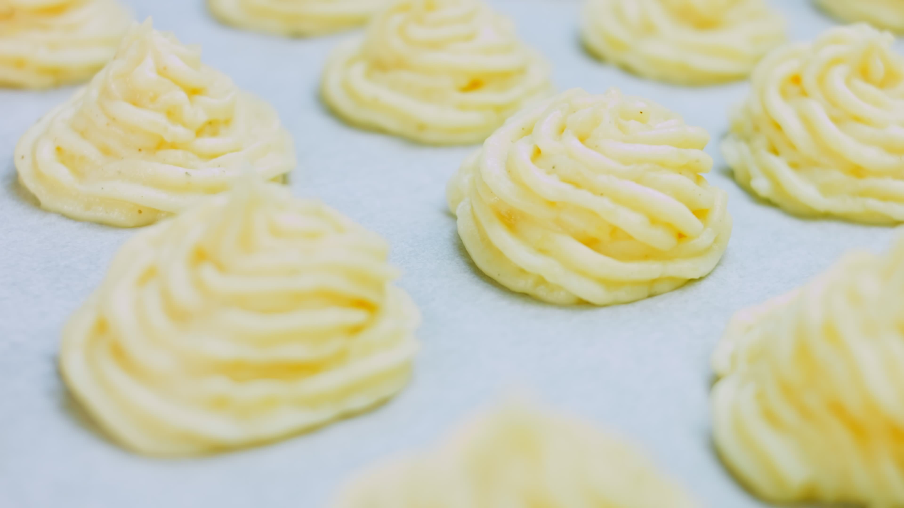 The chef makes potato cookies using a food bag. Potato cookies canonic recipe Brie, parmesan and ...