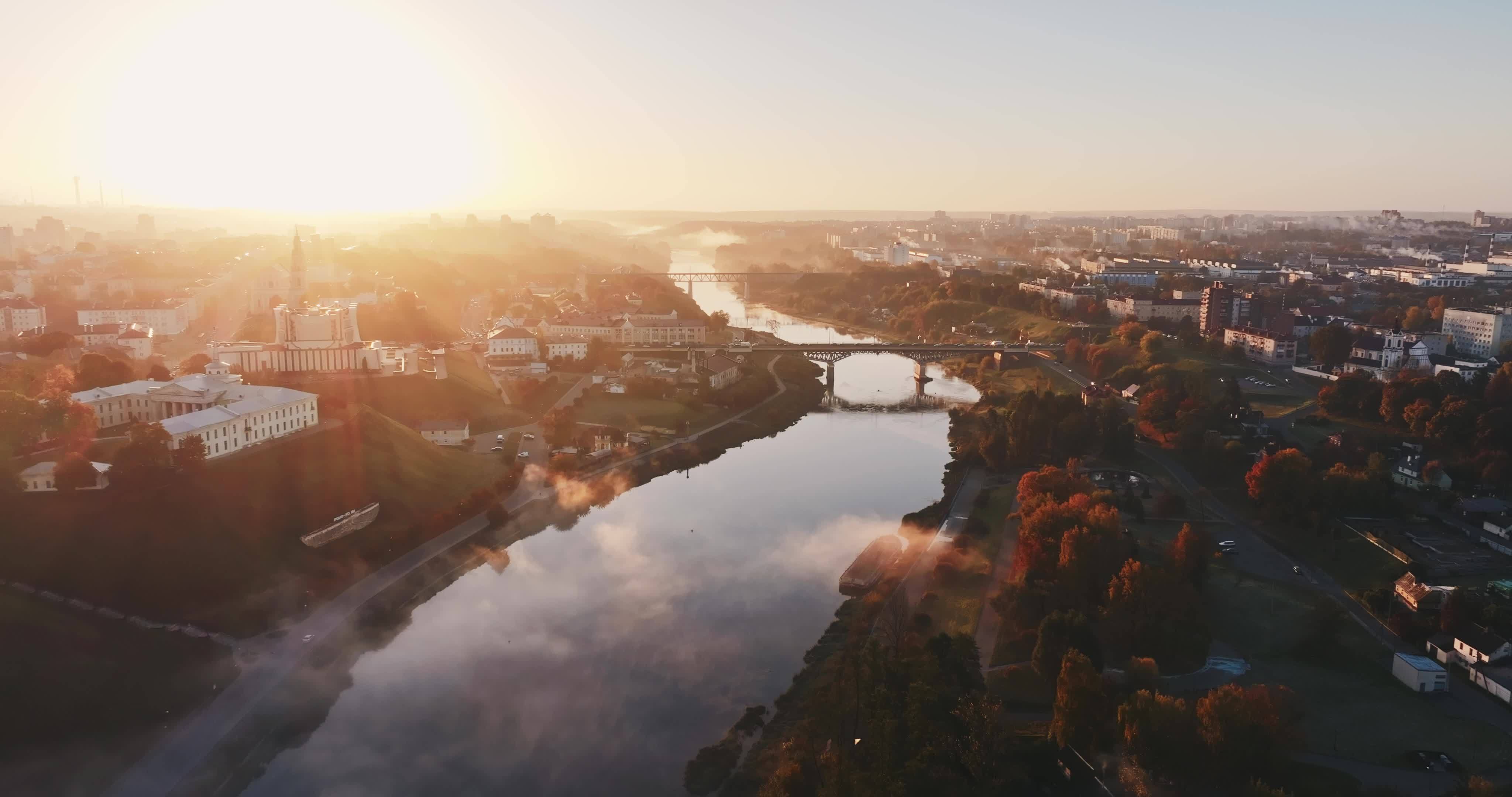 flight over the river in the morning mist, panoramic view of bridge 15233996 Stock Video at Vecteezy
