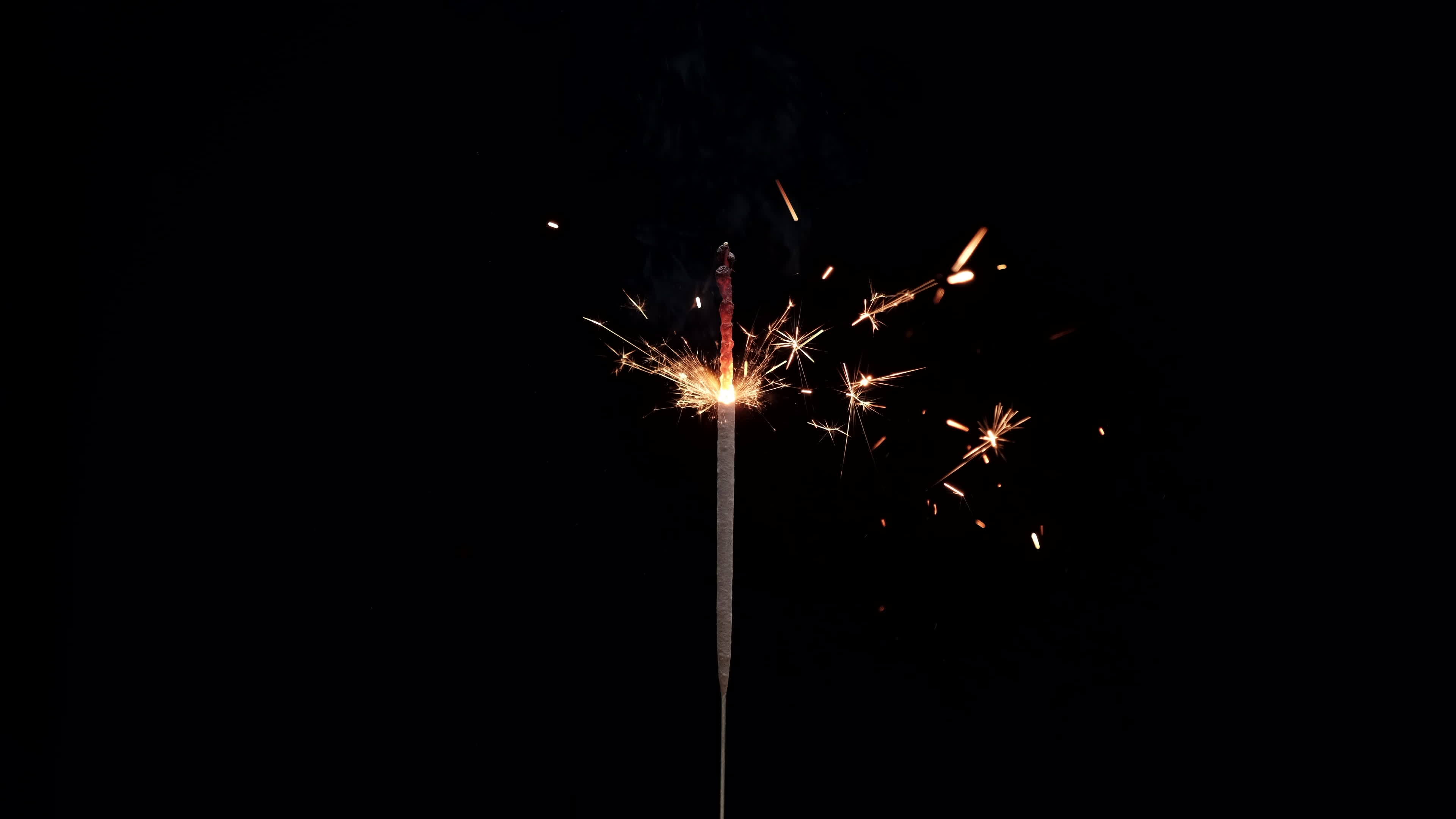 Sparklers fireworks for event celebration, New Year Eve, Christmas, birthday on black background ...