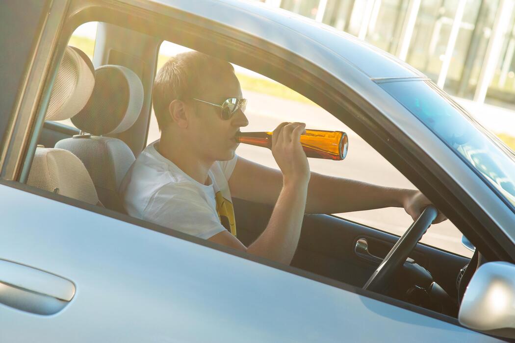 Drinking While Driving Stock Photos, Images and Backgrounds for Free ...