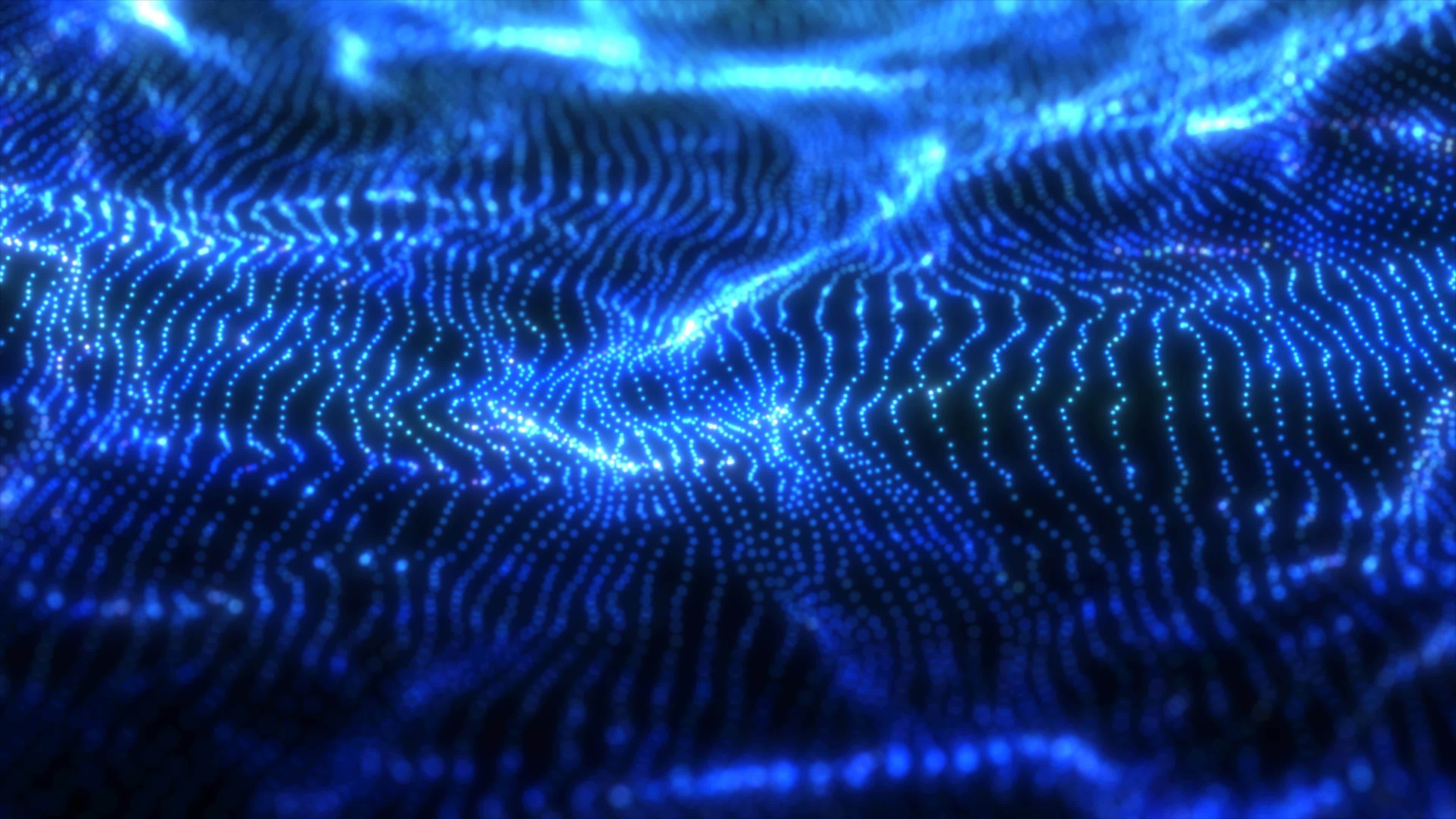 Abstract blue futuristic waves from a grid of particles lines glowing bright shiny neon digital ...
