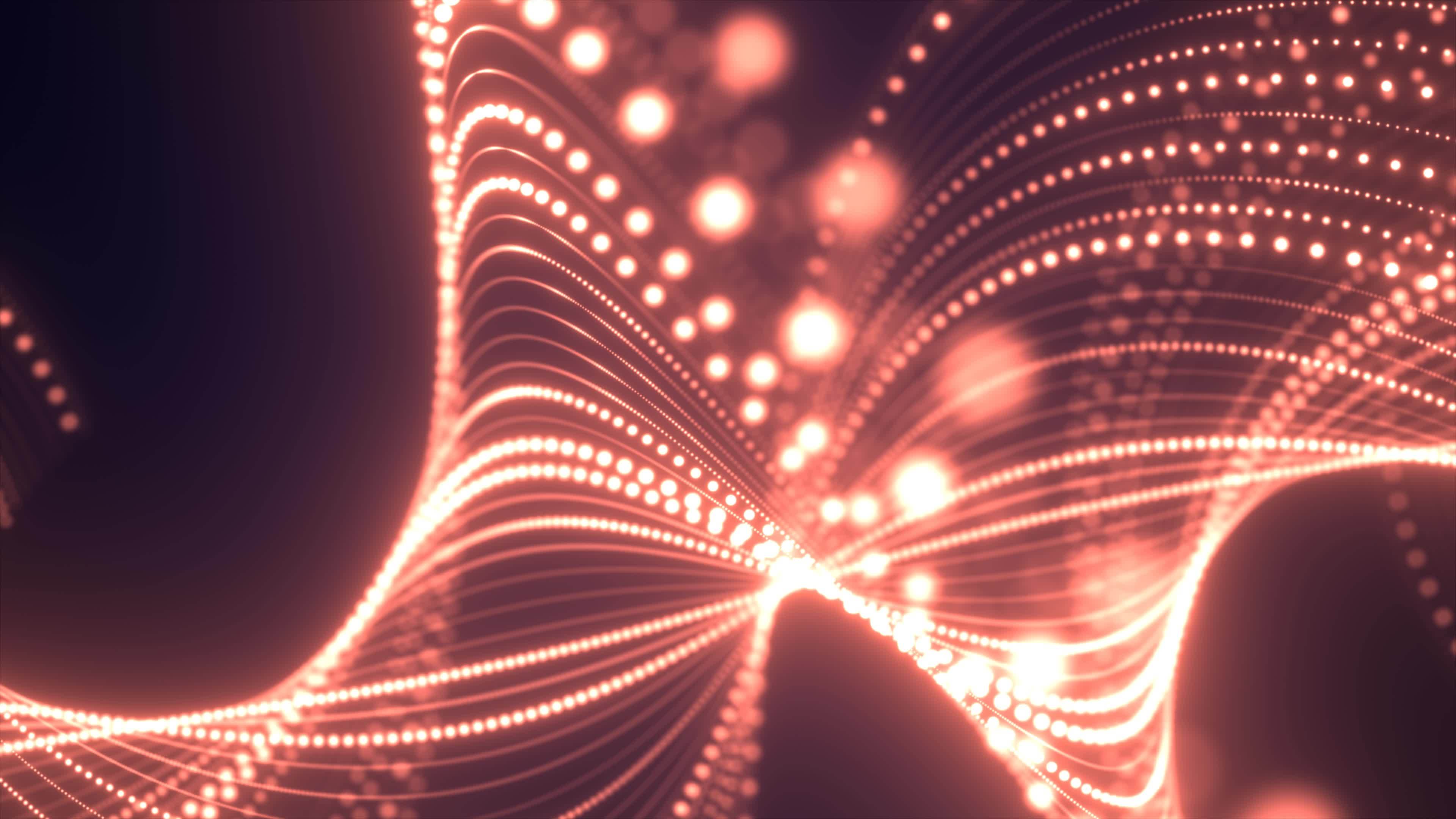 Abstract orange waves from lines and dots of particles of glowing swirling futuristic hi-tech ...