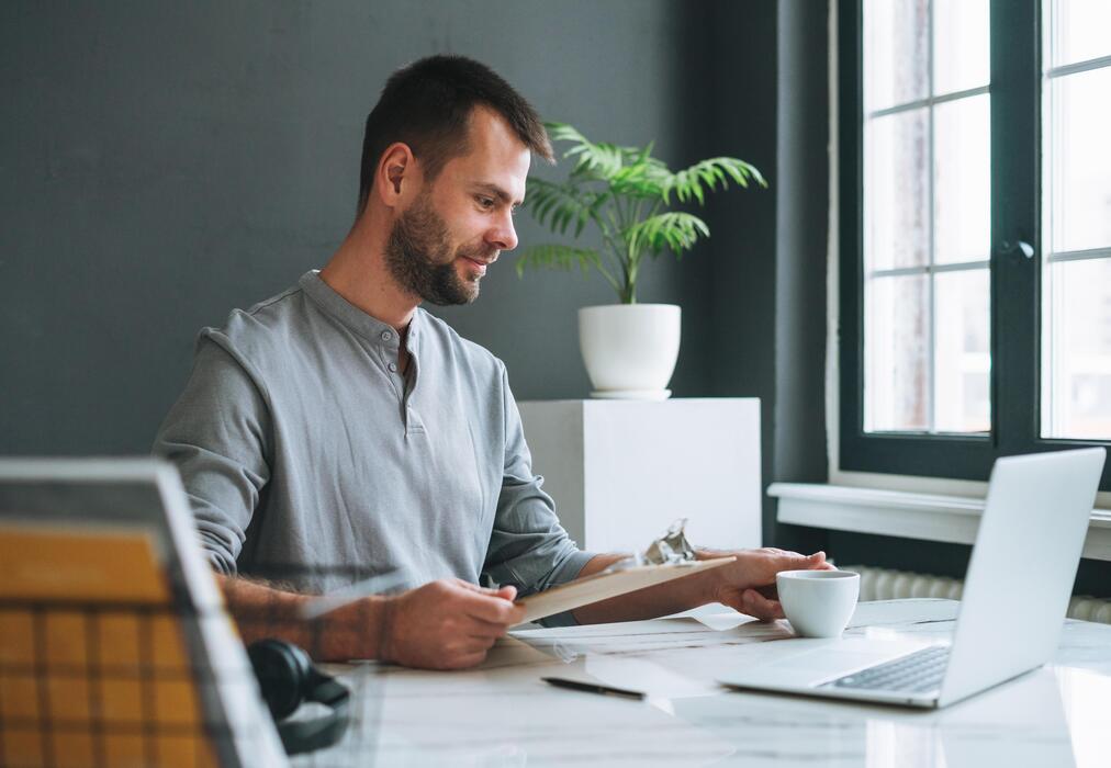Man Working On Desk Stock Photos, Images and Backgrounds for Free Download
