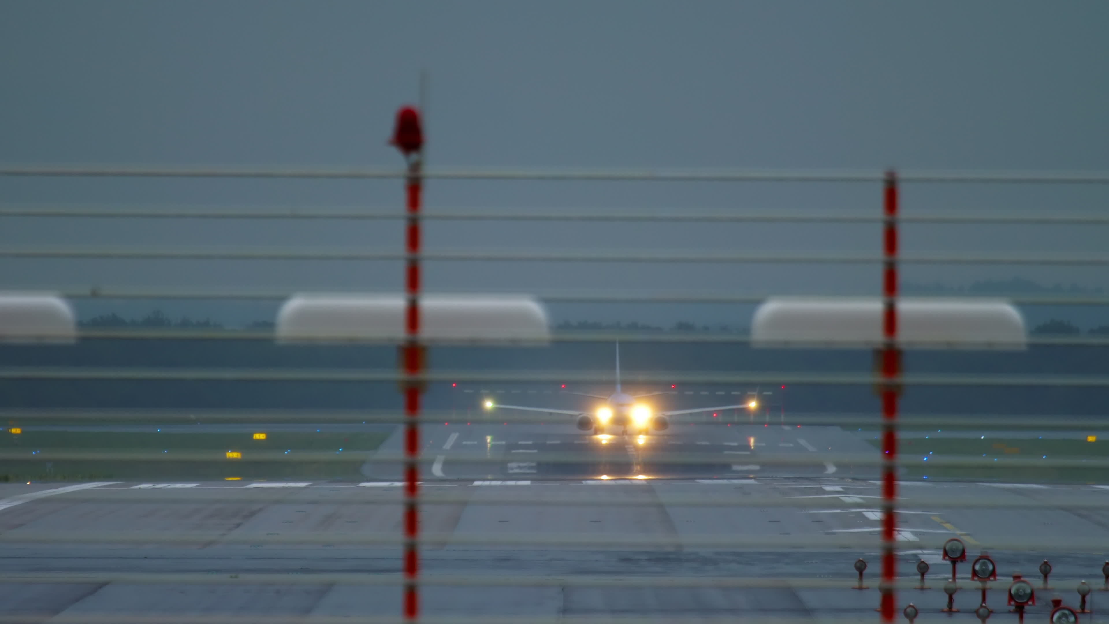 The plane accelerates before takeoff at dawn in the early morning ... The plane accelerates before takeoff at dawn in the early morning ...