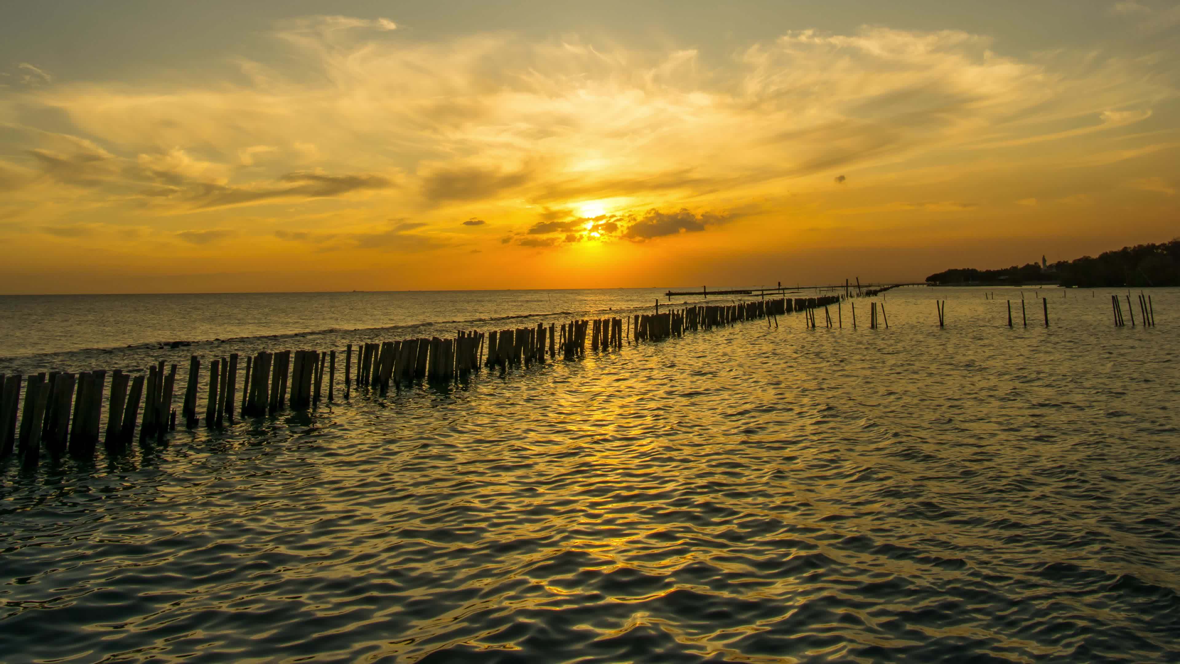 Sunset by the sea, Samut Sakhon, Thailand 18108048 Stock Video at Vecteezy