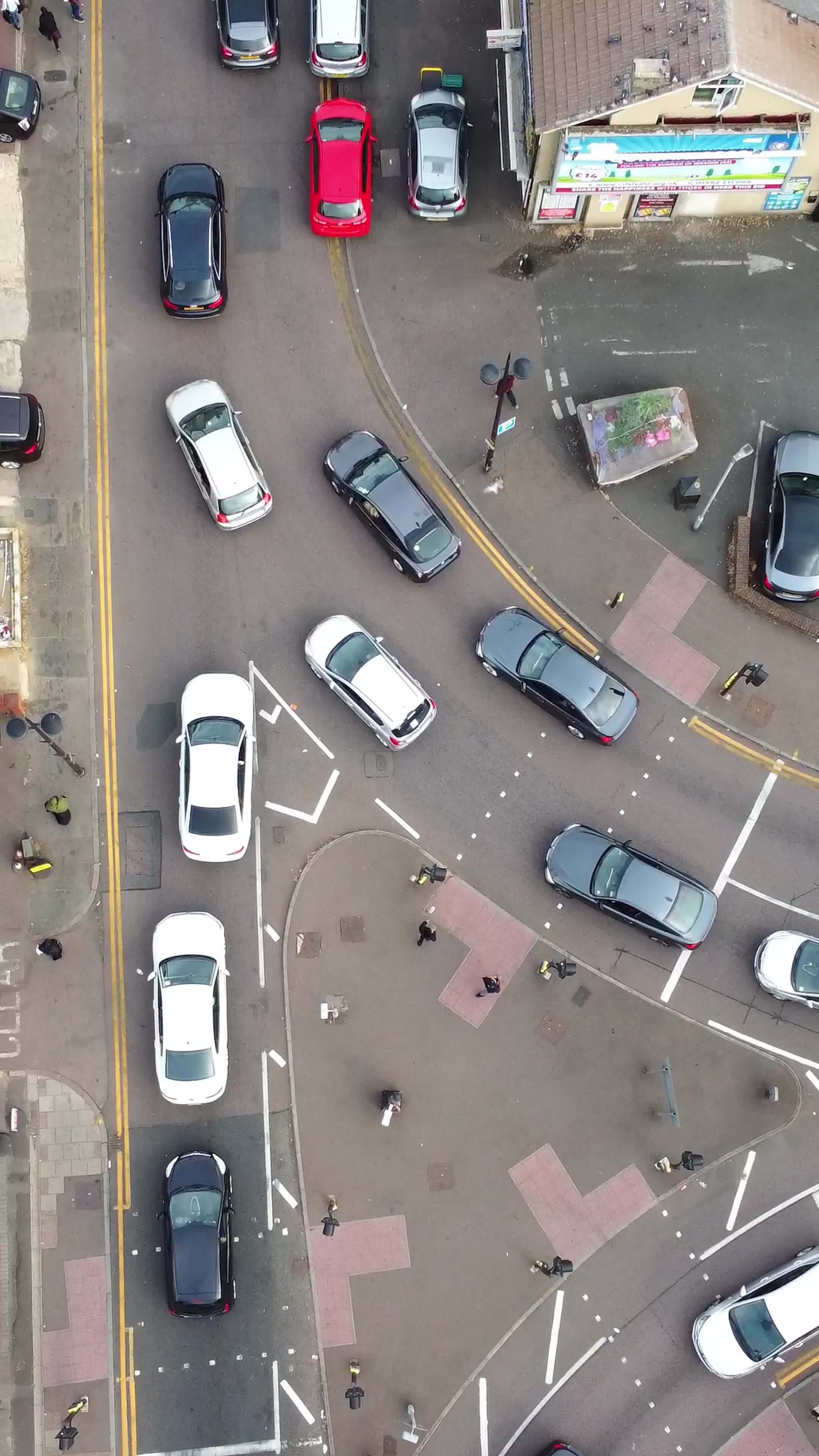 Aerial View of British Roads and Traffic Passing Through City. Drone's Camera Footage in ...