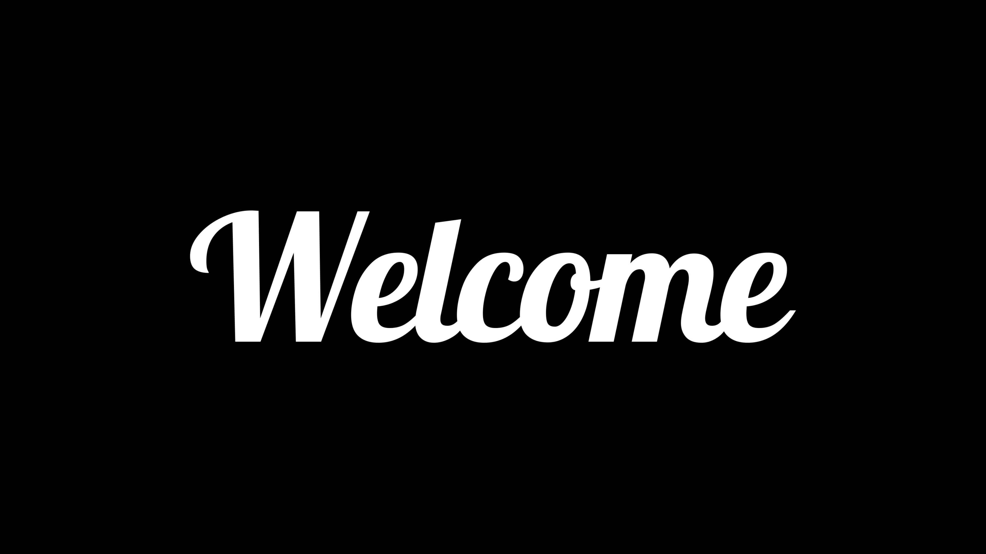 Welcome text in white on black screen background. Animated welcome word ... Welcome text in white on black screen background. Animated welcome word ...