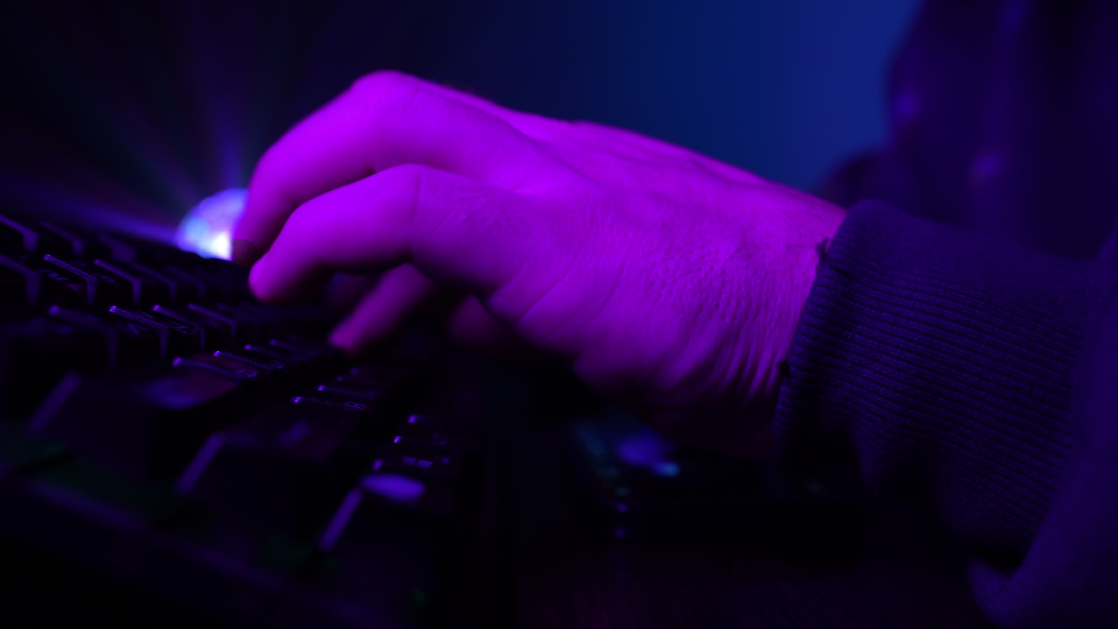 Close-up, Unrecognizable Man Using a Computer Keyboard to Code a ...