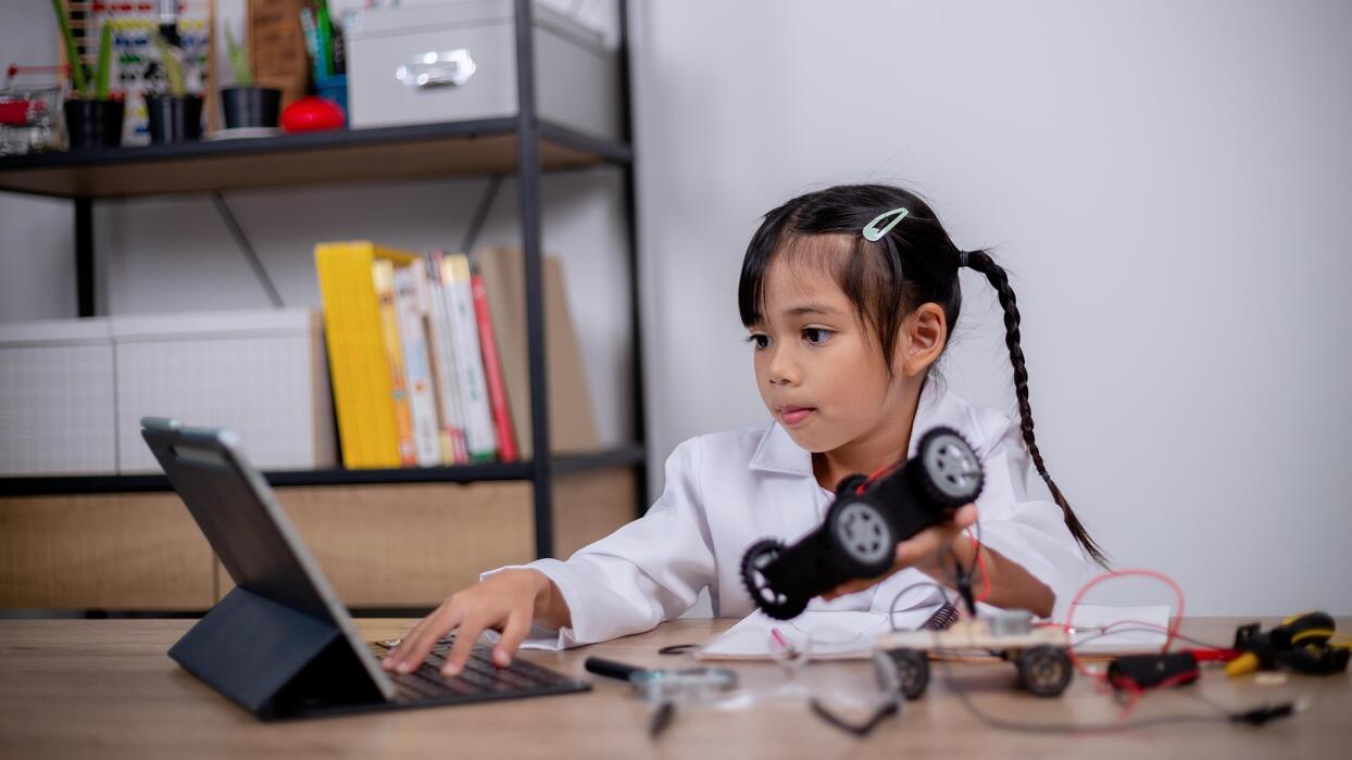 Kid Coding Stock Photos, Images and Backgrounds for Free Download