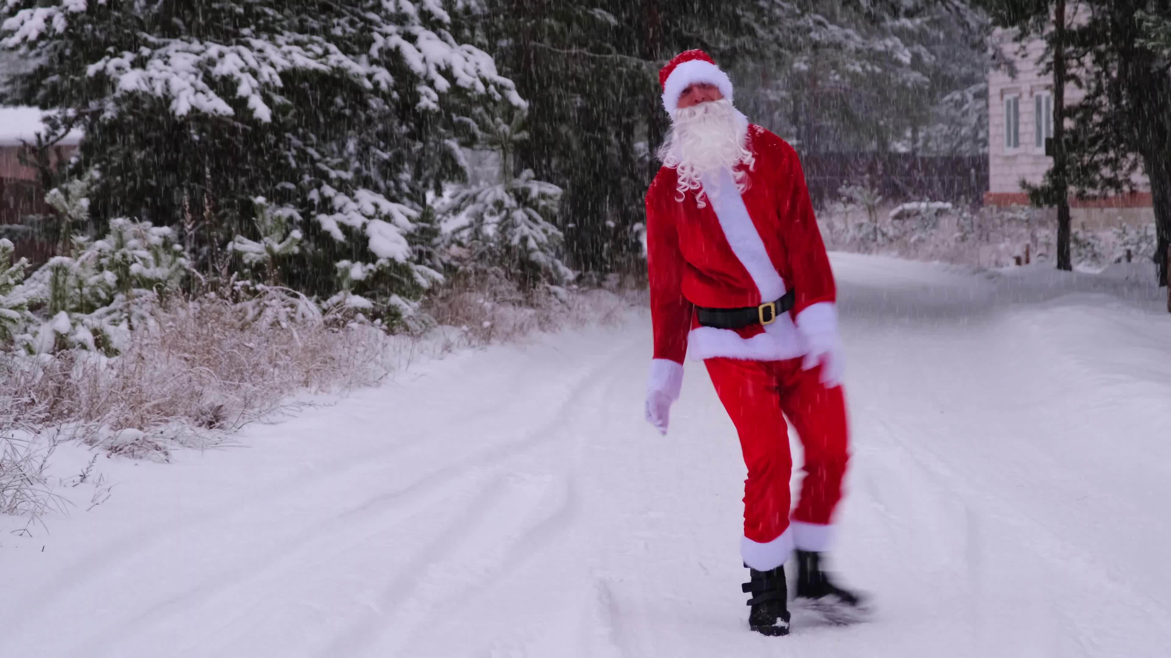 Santa Claus Is Having Fun And Funny Dancing Shows Acrobatic Tricks Elements Of Fighting And