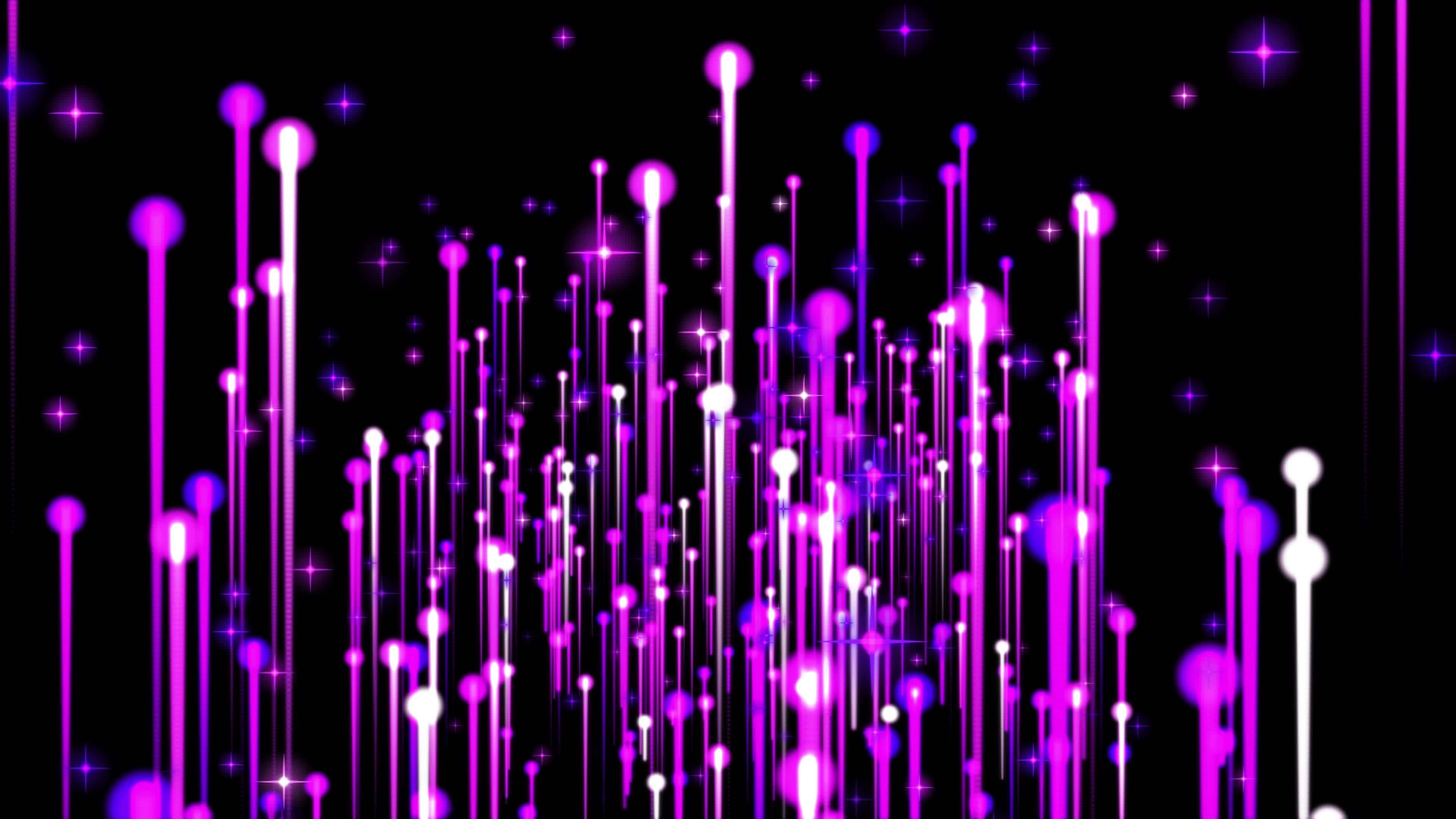 Abstract Animation Of Glowing Gold Particles With Rays Loopable