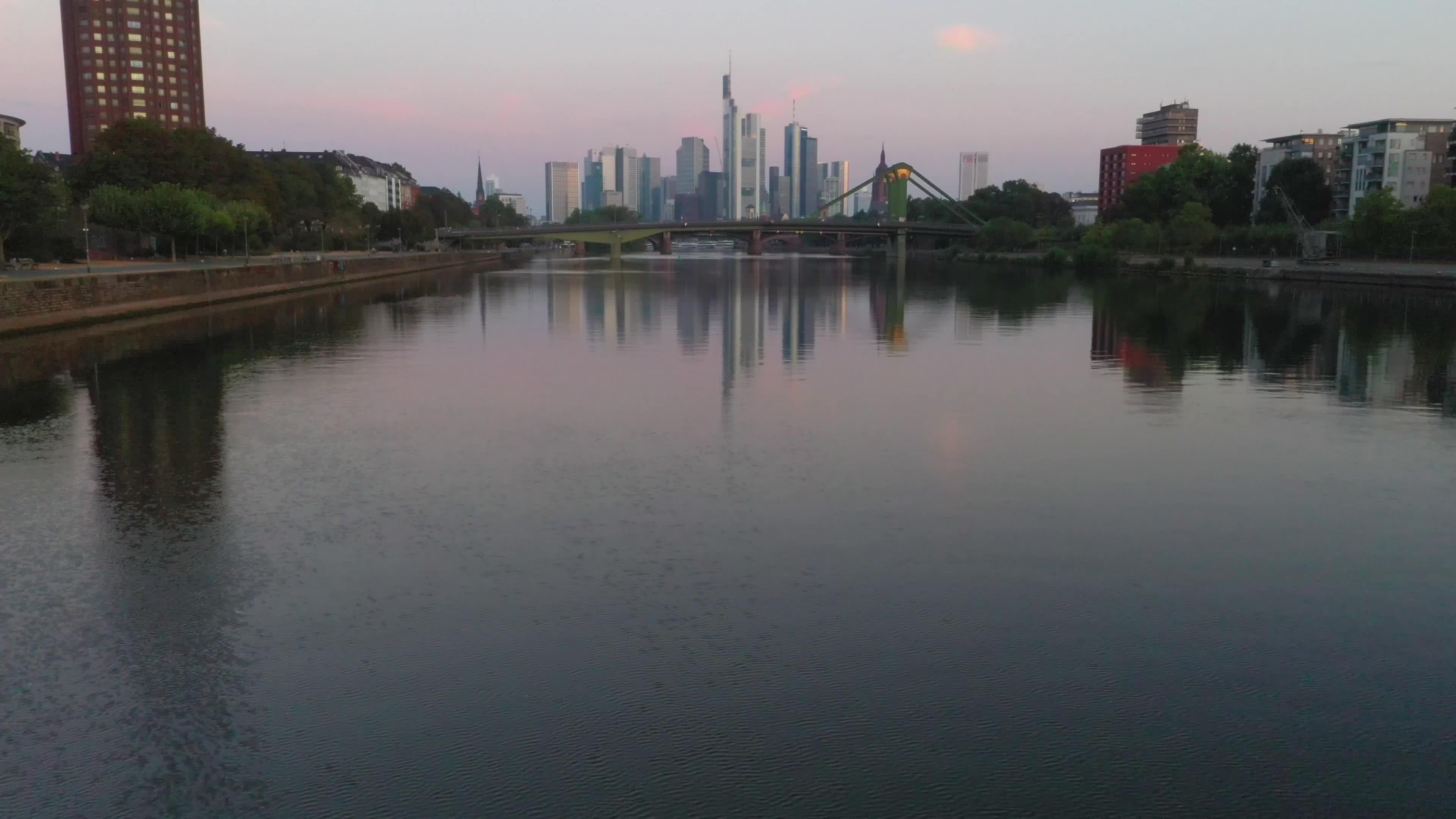 Drone movie flying towards Franklfurt skyline over the river Main during sunrise 20016870 Stock ...