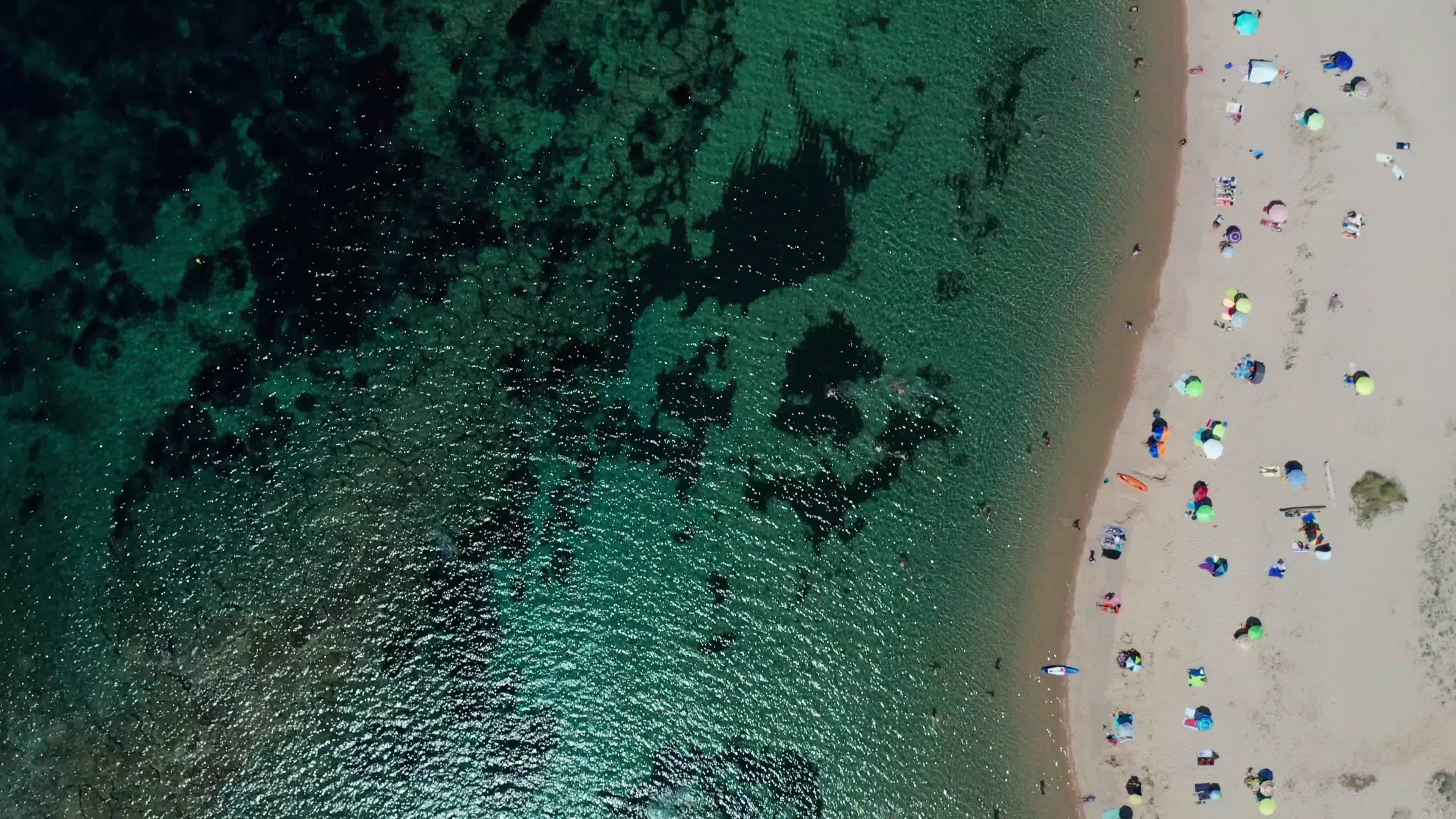 Aerial top down view of a beach at sea coast 20751227 Stock Video at Vecteezy