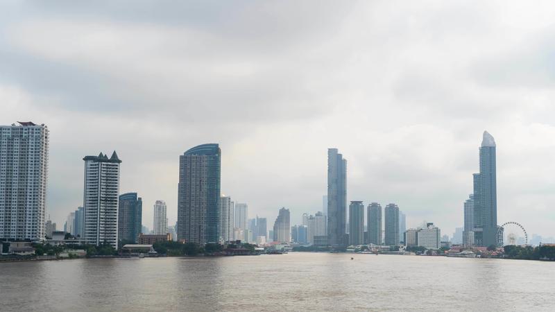 View of tall buildings at Chao Phraya River Bangkok business district, Timelapse view of Bangkok ...