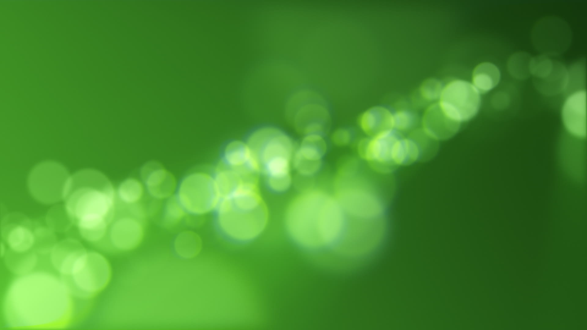 Defocused green bokeh lights background. This elegant motion animation with sphere bokeh ...
