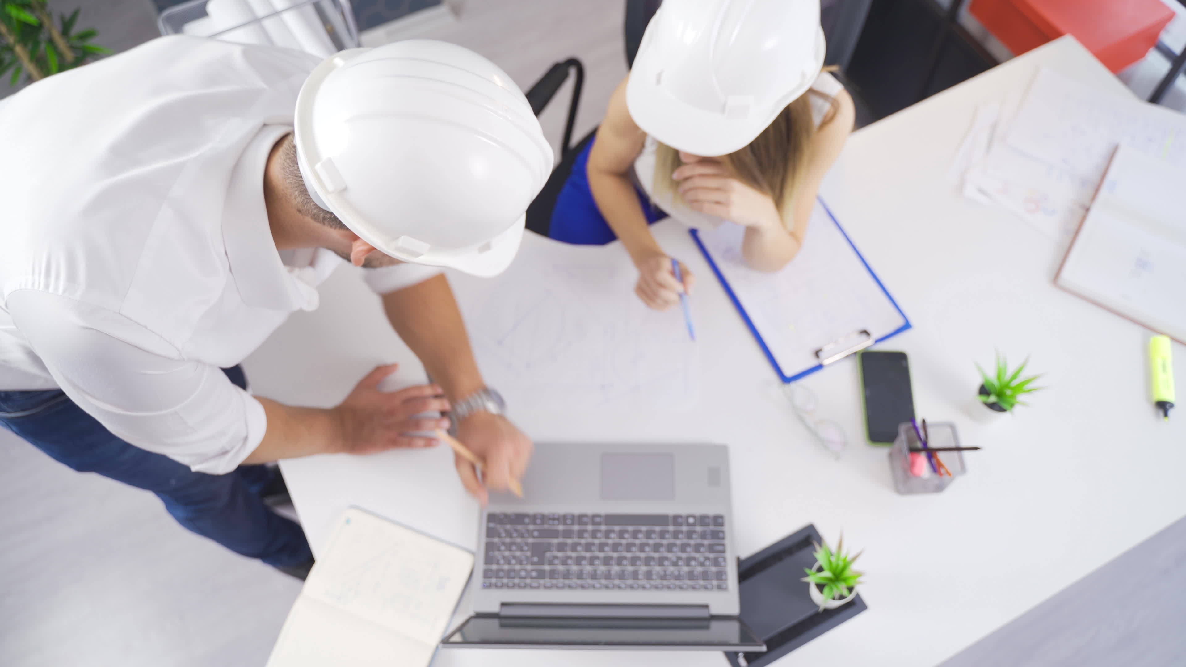 Engineers draw projects, architecture, drawings with a ruler. Male ...