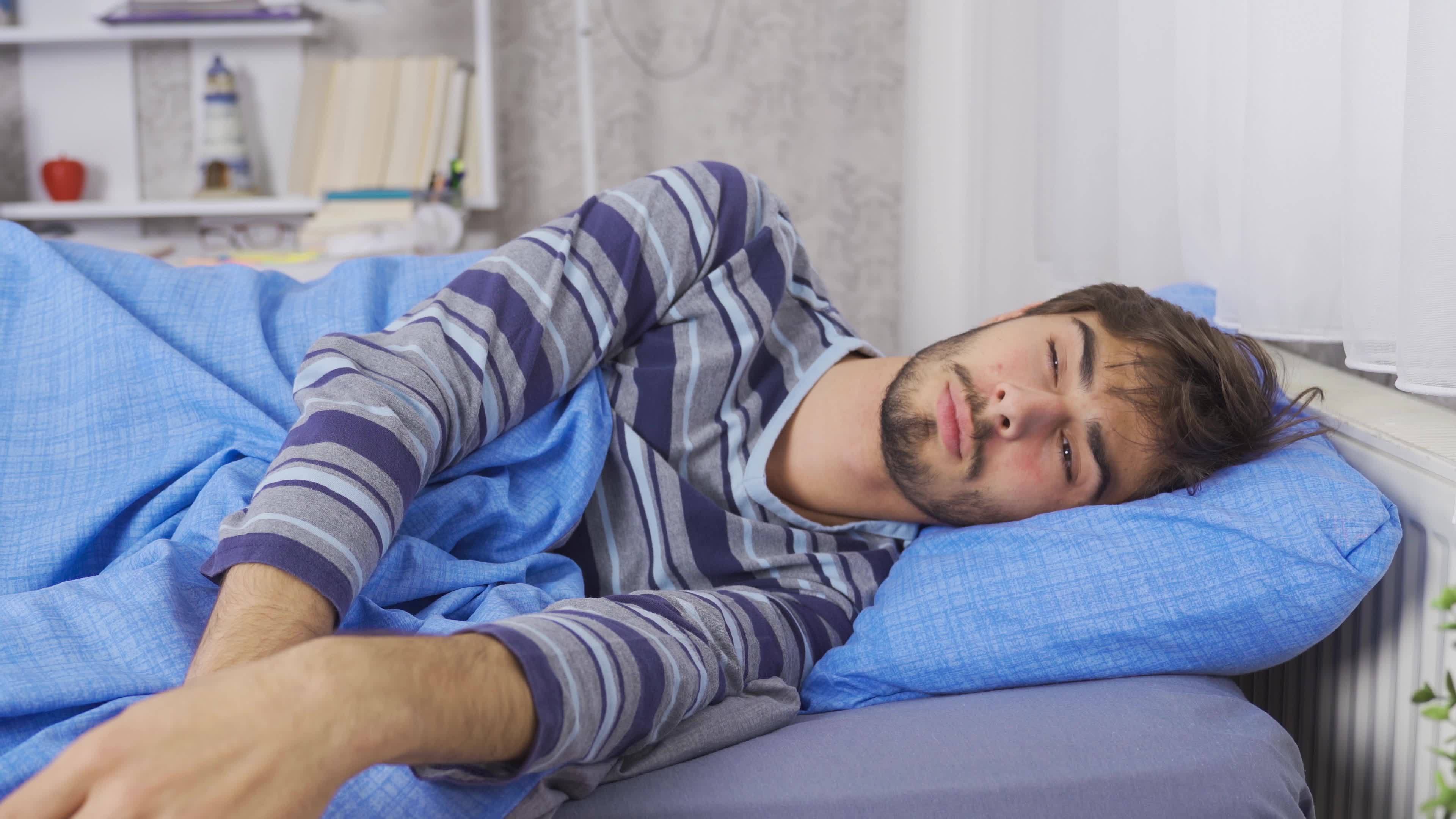 Close-up of man waking up. To wake up. Happy awakening. Close-up of man ... Close-up of man waking up. To wake up. Happy awakening. Close-up of man ...