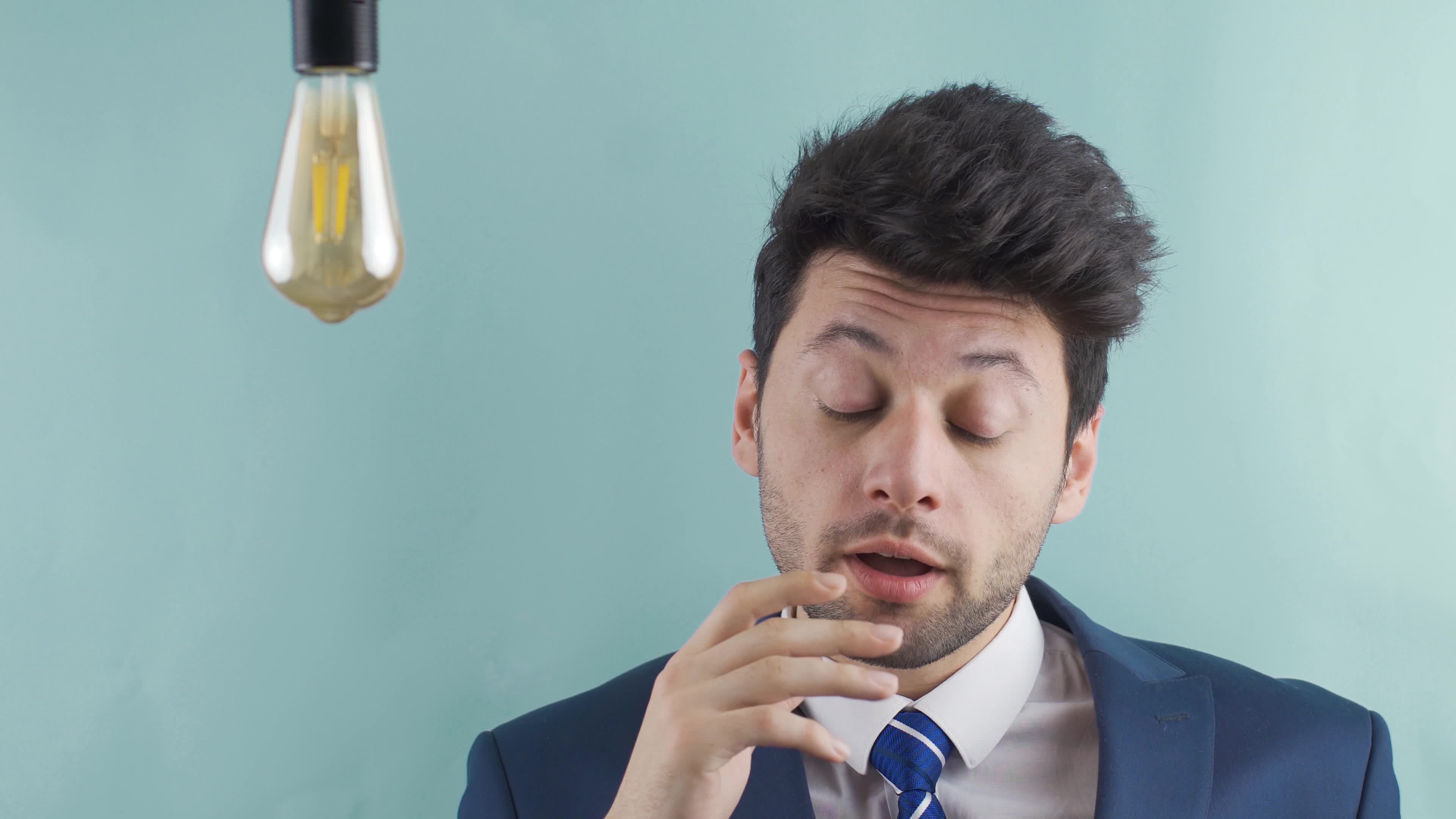 Businessman's eureka moment. Creative and smart businessman coming up ...