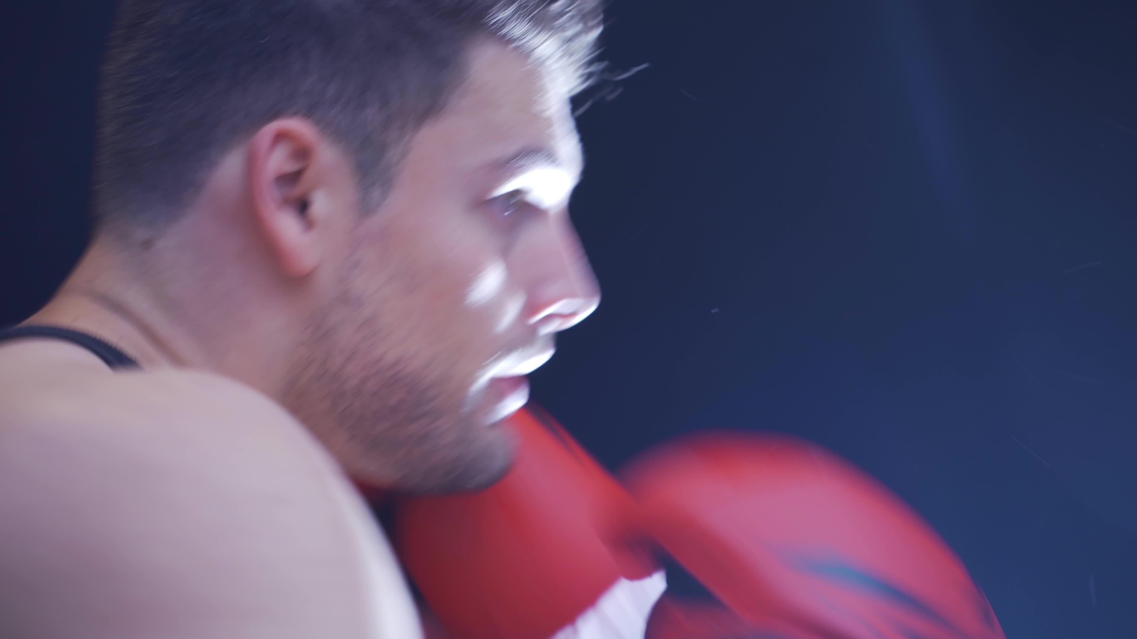 Sporty Boxer Man Punches Punching Bag Strong And Agile Boxer Young Athlete Boxing By Beating