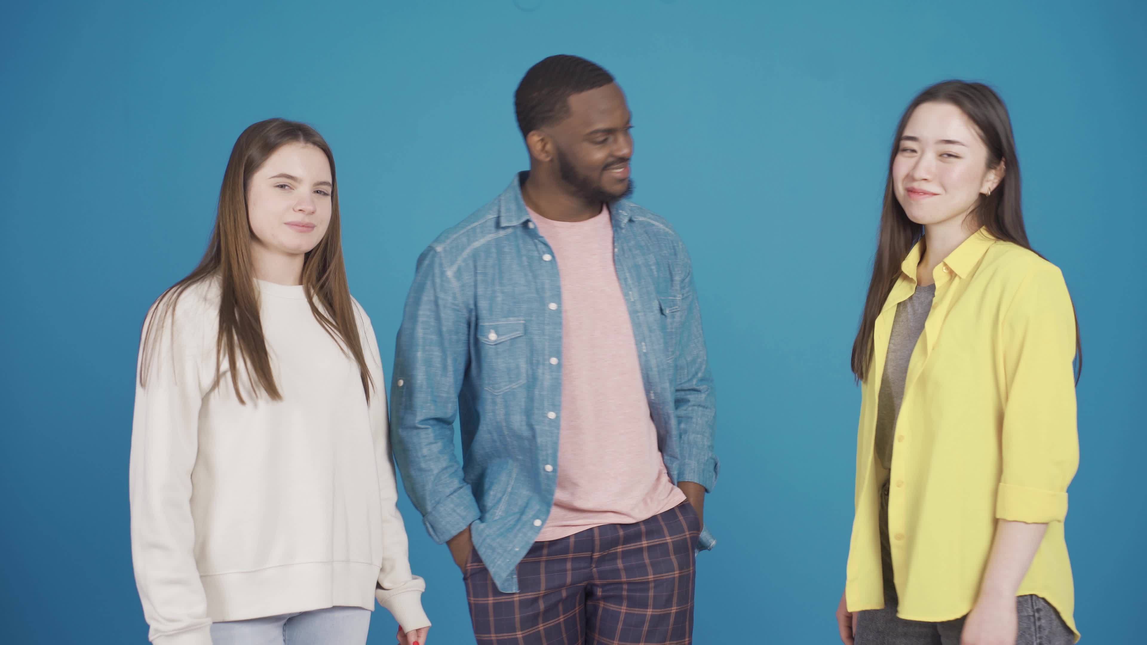 Happy and smiling multiethnic group of friends dancing, having fun and ...