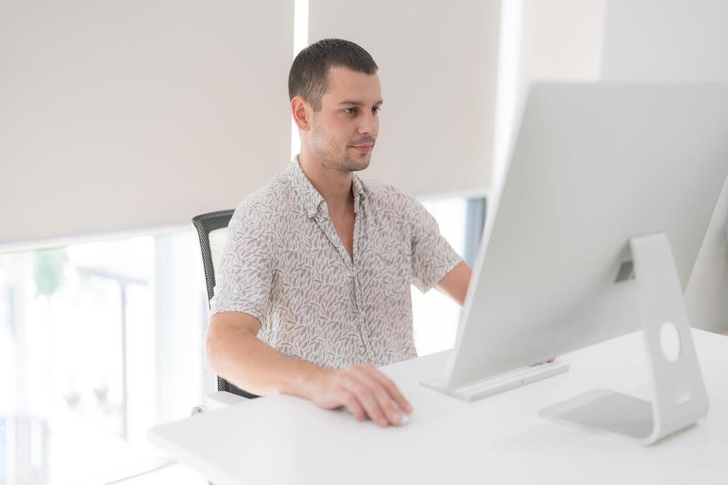 Man Using Computer Stock Photos, Images and Backgrounds for Free Download