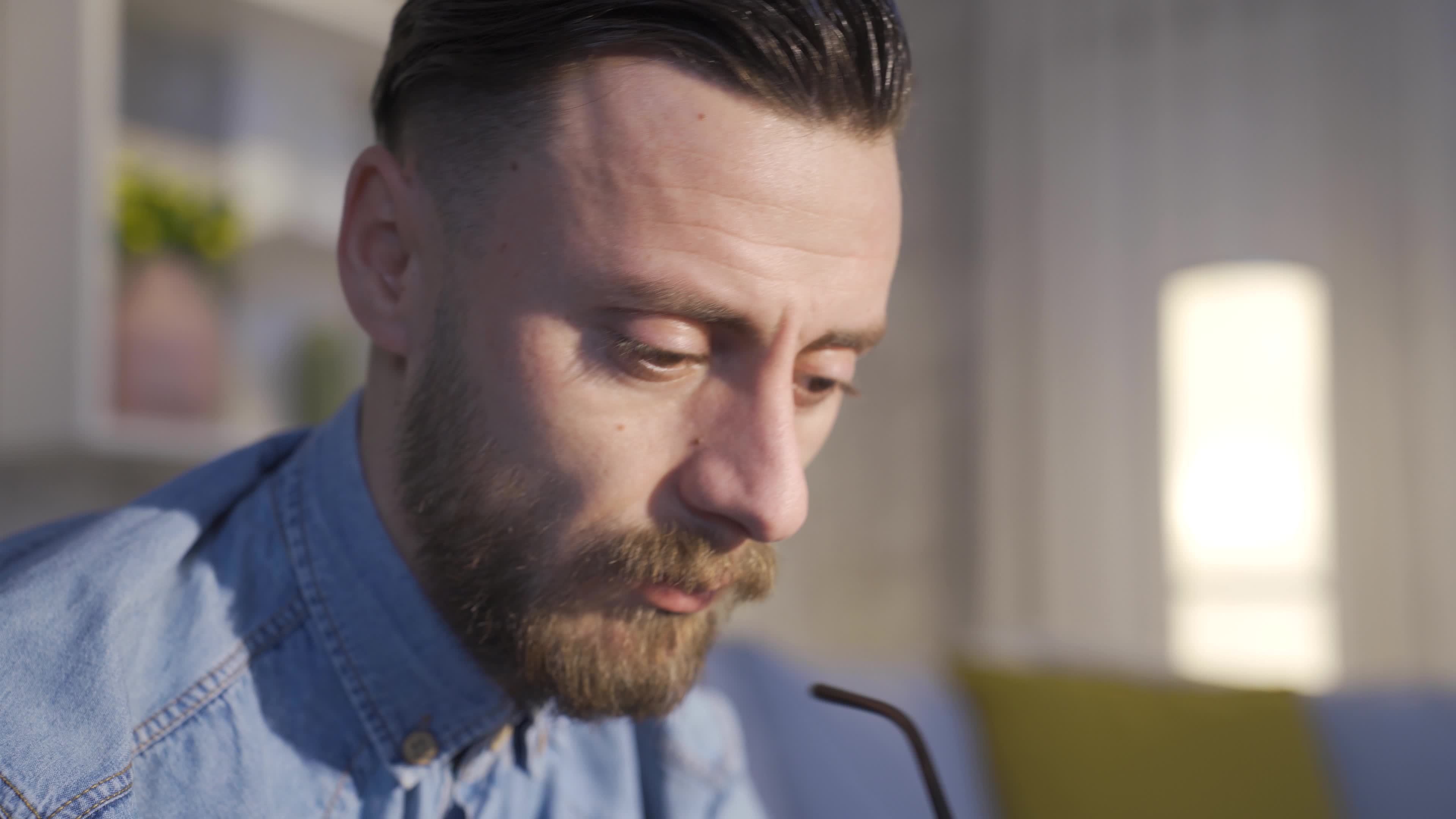 Sad worried young male. An attractive face trying to deal with ...