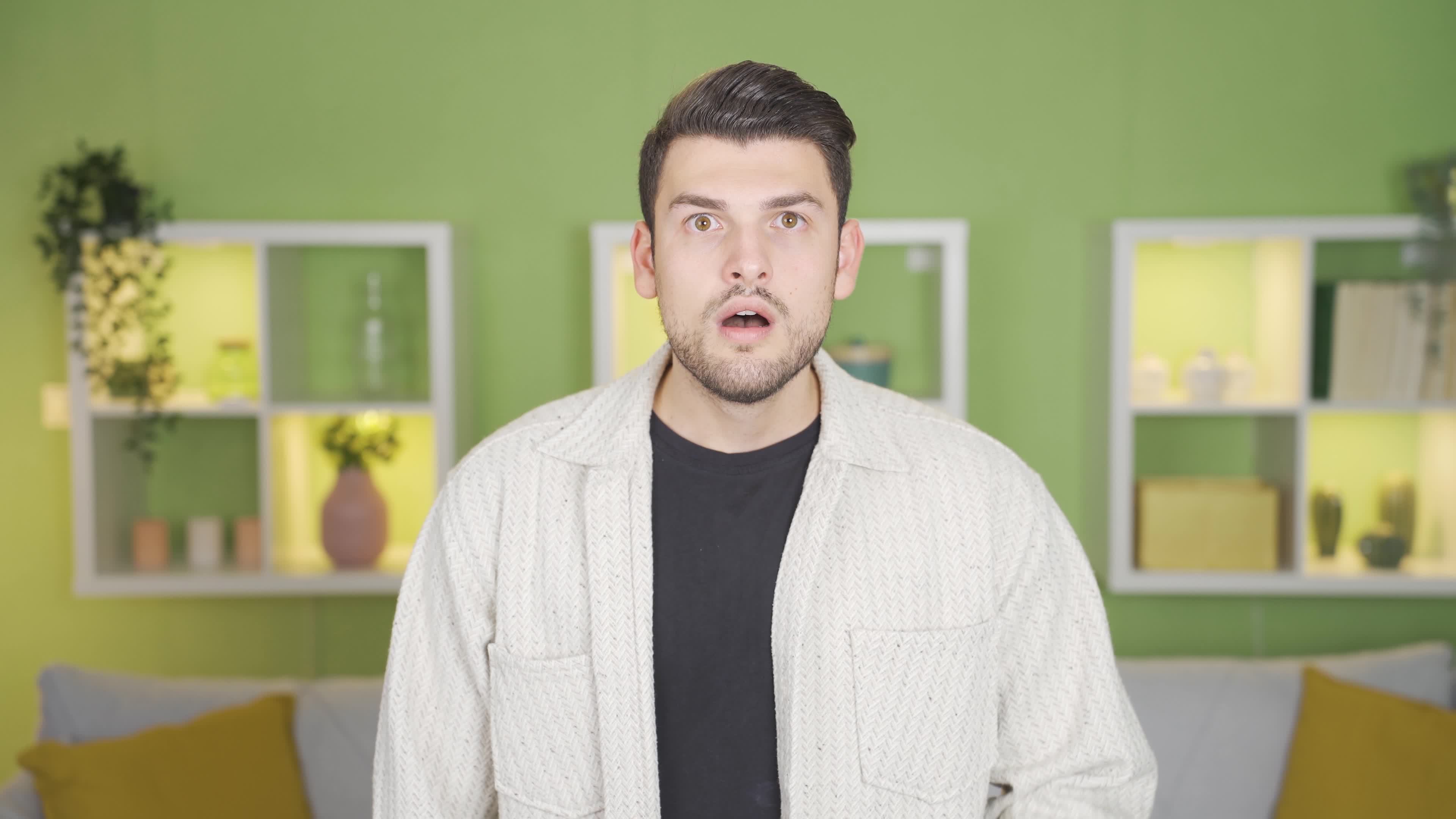 Young man making confused facial expression looking at camera. Young ... Young man making confused facial expression looking at camera. Young ...