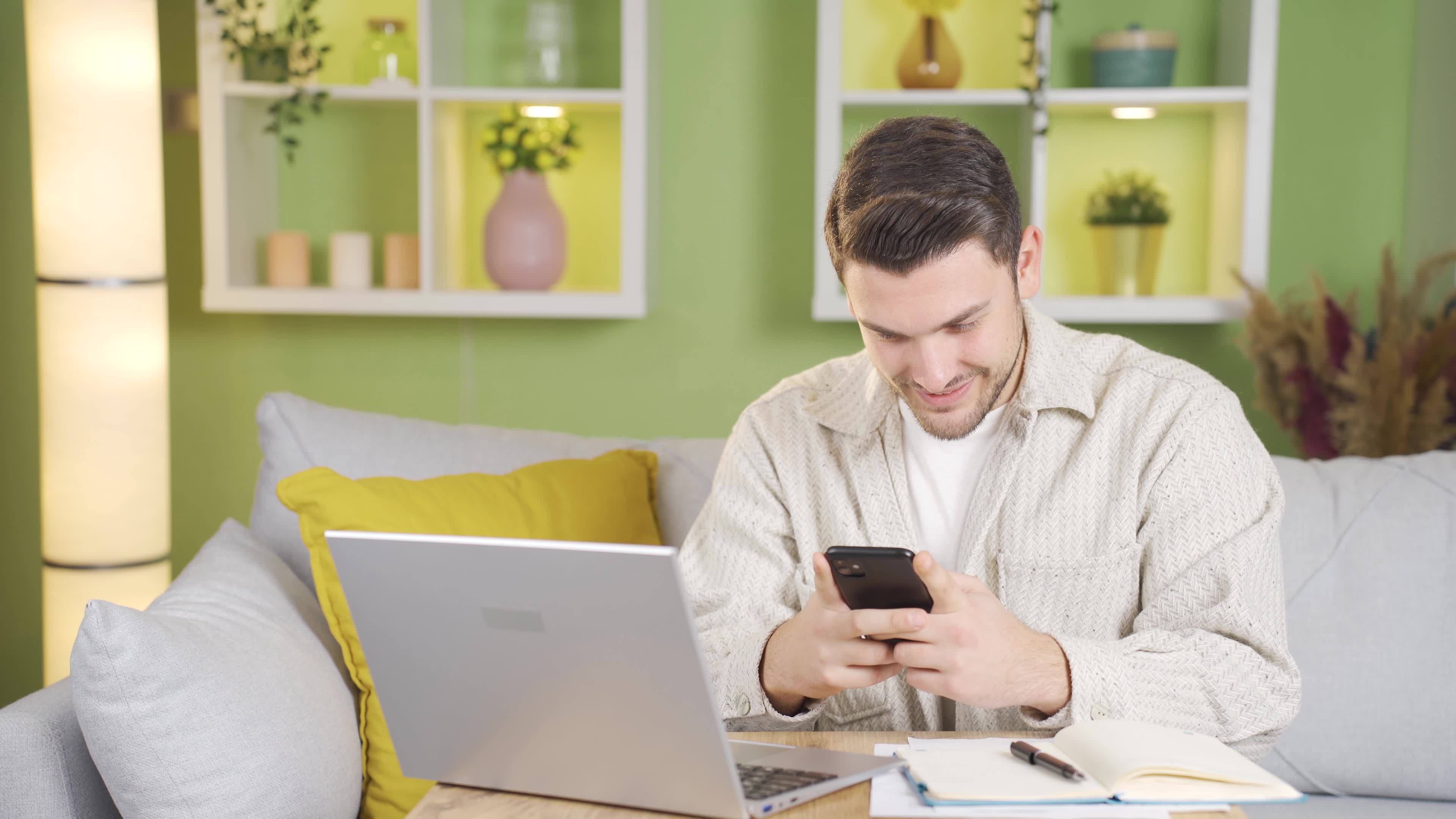 Young Happy Man Texting With His Friend Girlfriend On The Phone Happy Man Laughing And Texting