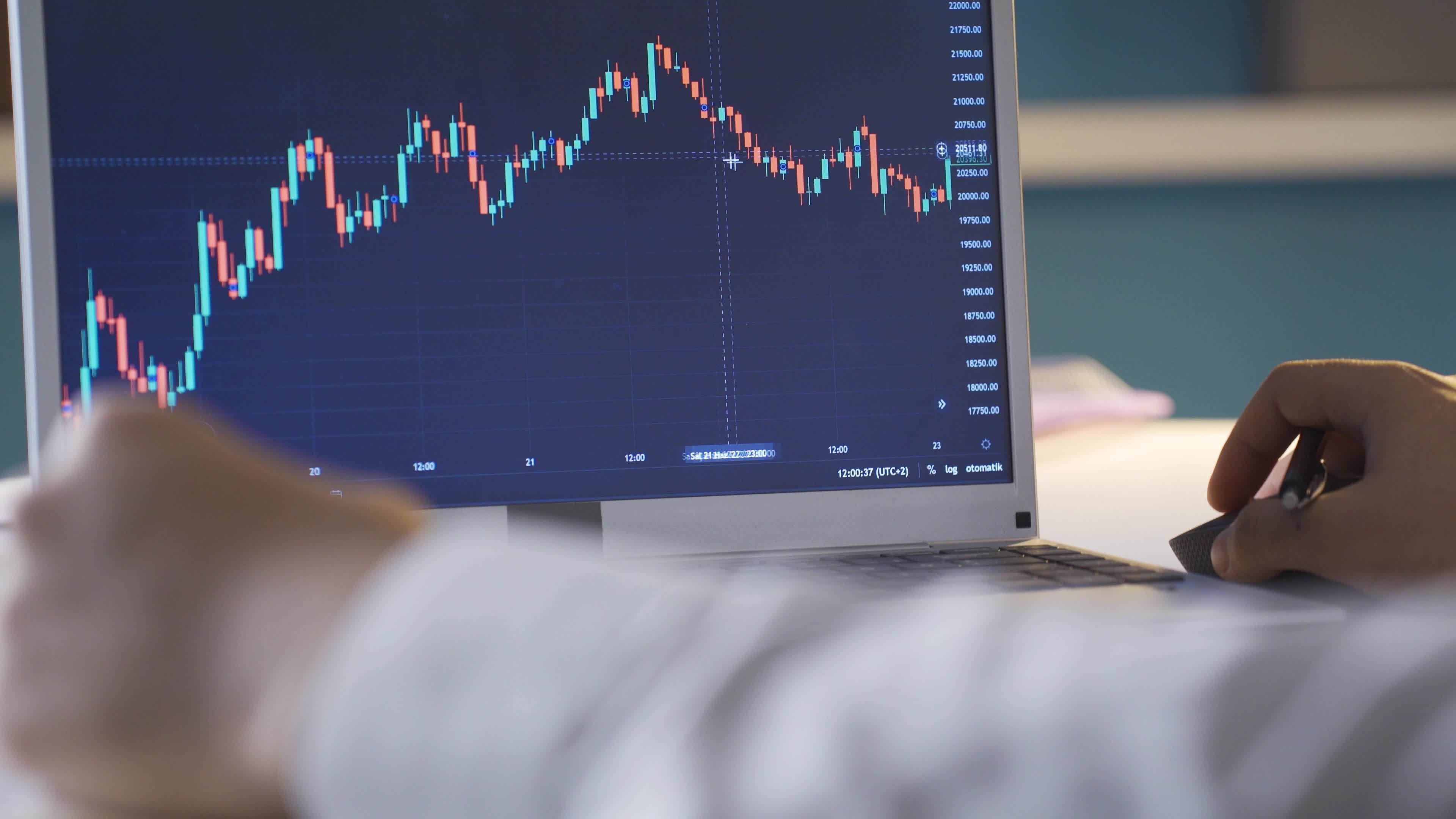 Stock Trader Man Looking At Computer Screen Analyzing Stock Trading