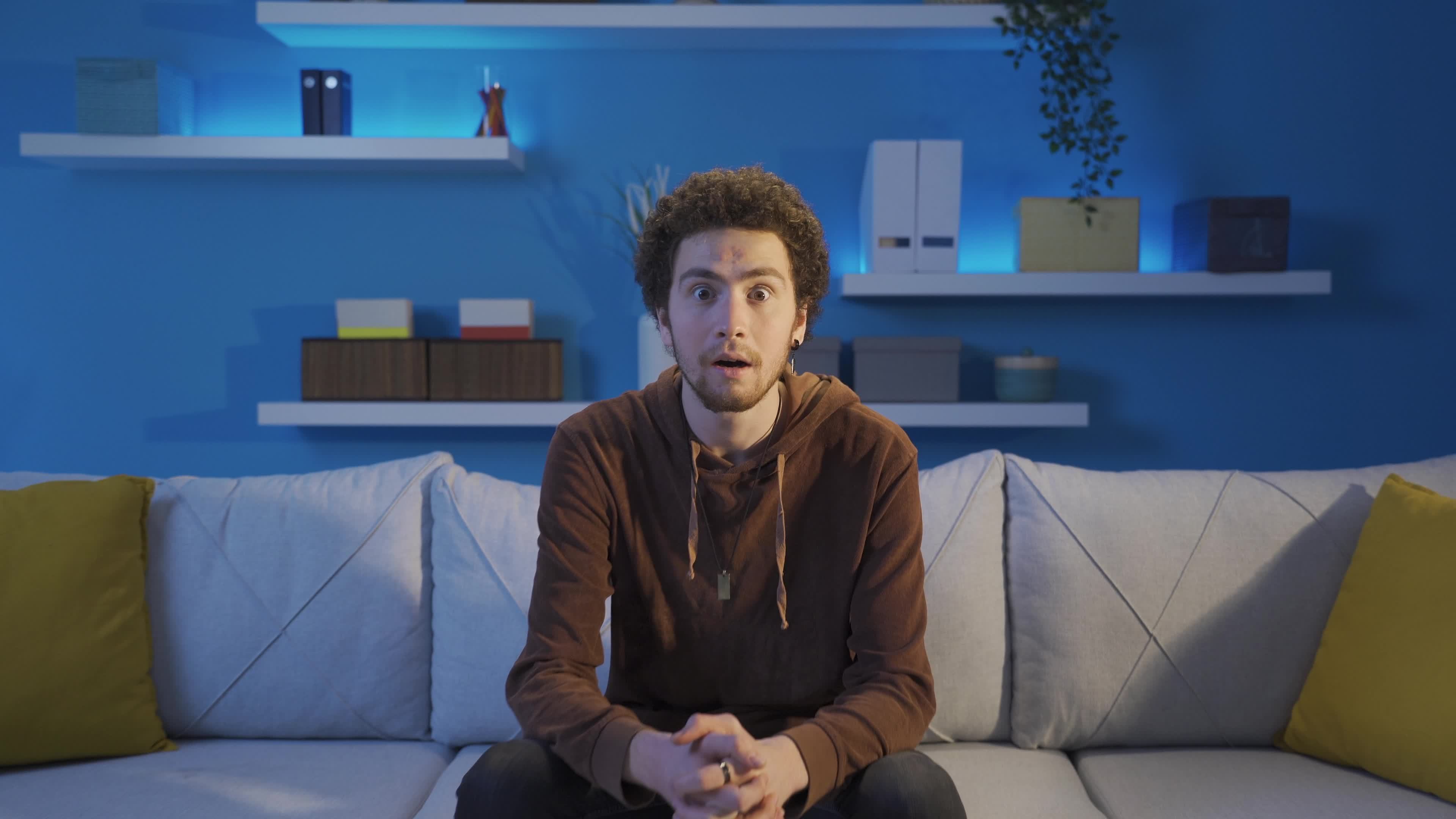 Portrait of young man looking at camera with great surprise. Funny and ...