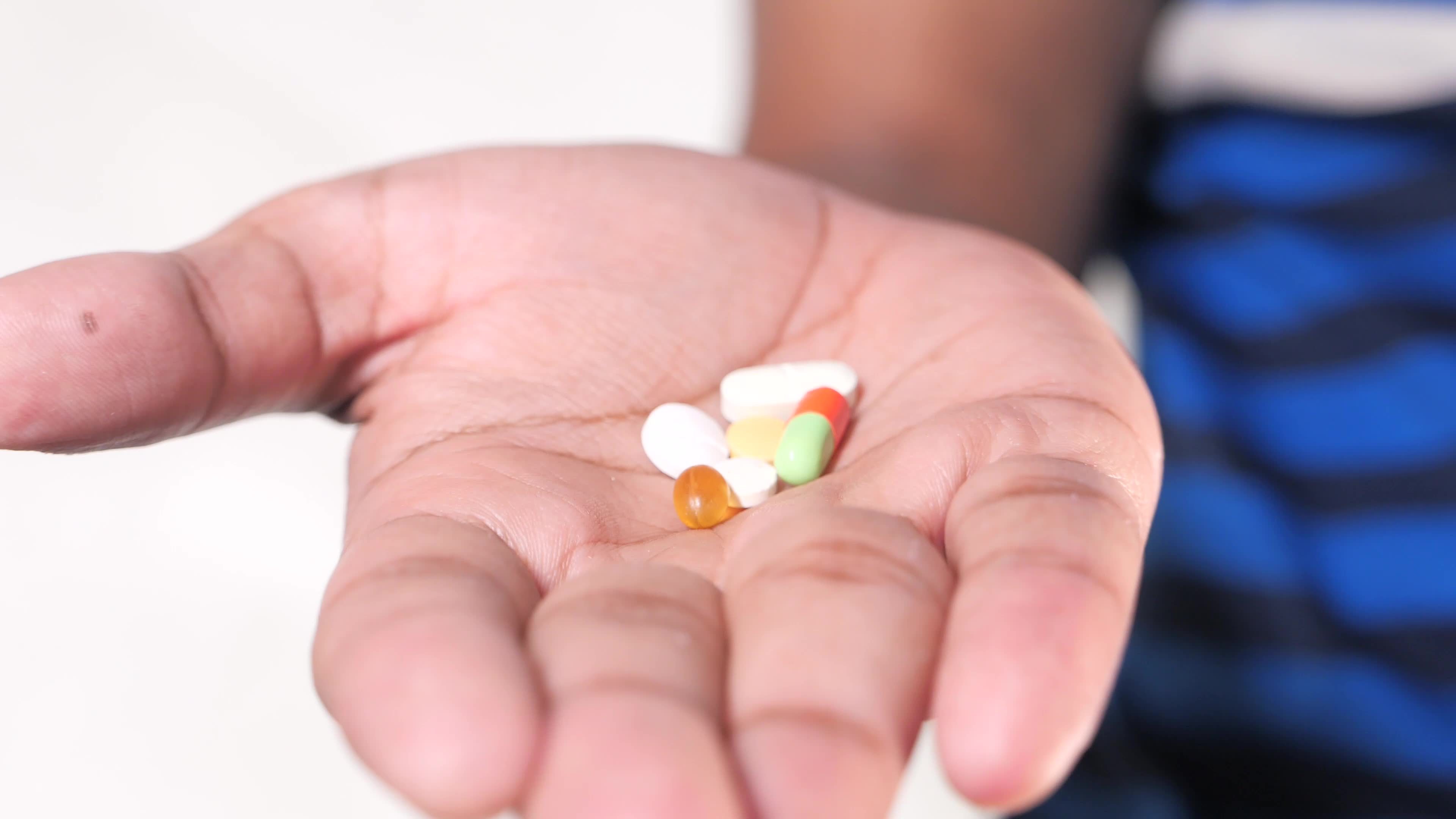 Pills Or Medicine On Palm Of Hand 22169713 Stock Video At Vecteezy pills-or-medicine-on-palm-of-hand-22169713-stock-video-at-vecteezy