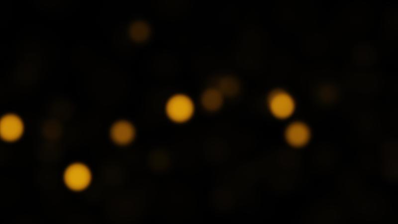 Loop glow gold bokeh animation on black background 22430342 Stock Video at Vecteezy