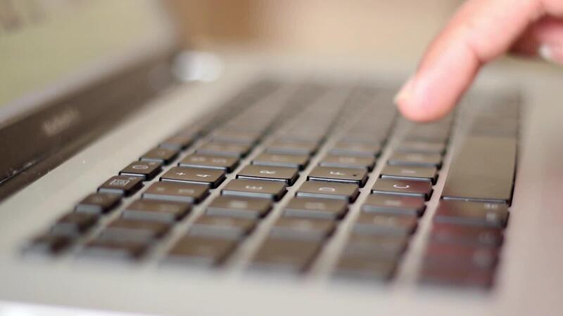 Hands typing laptop keyboard 22497660 Stock Video at Vecteezy