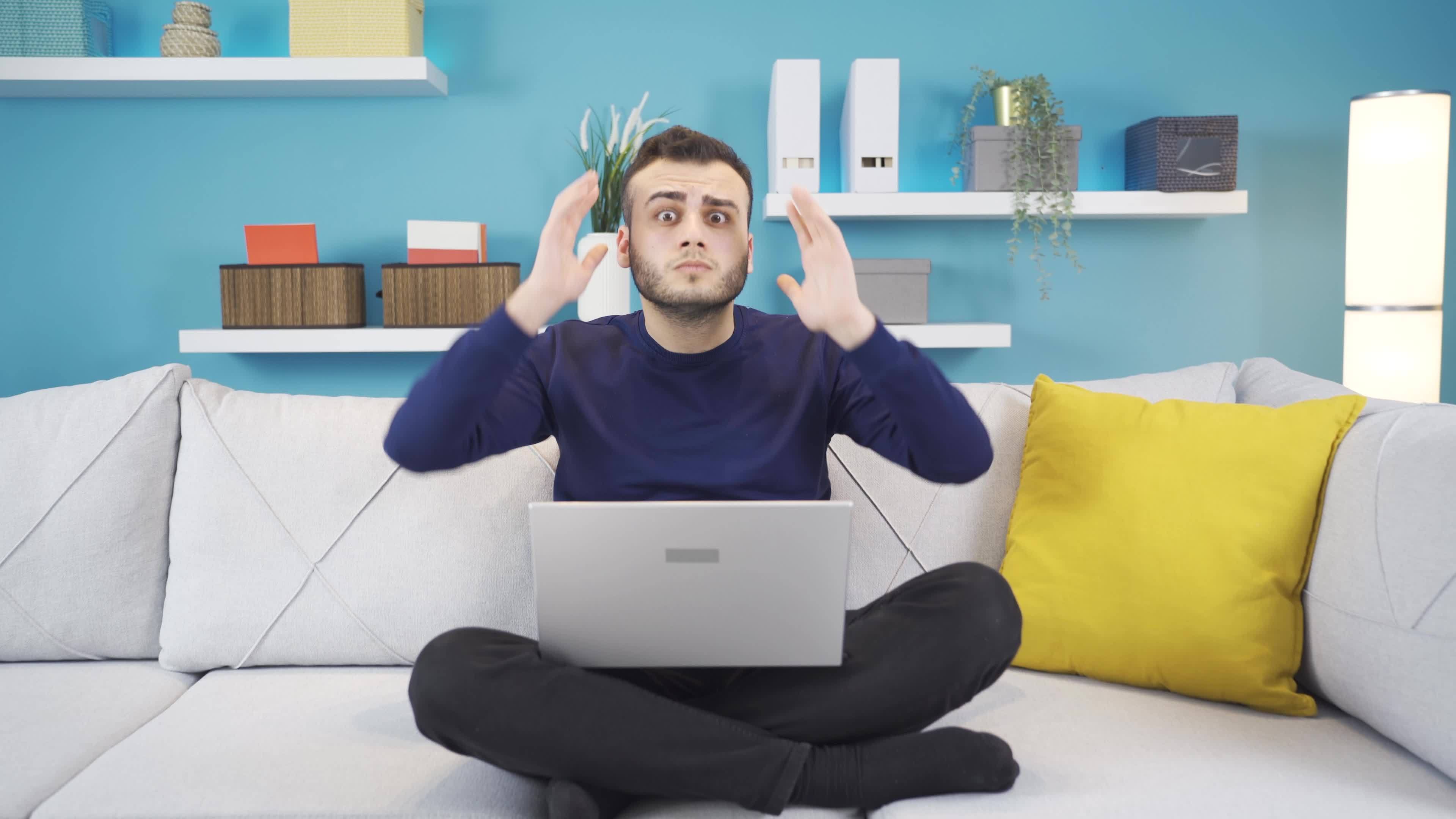 Portrait of frustrated sad young man. Frustrated young man at home ...