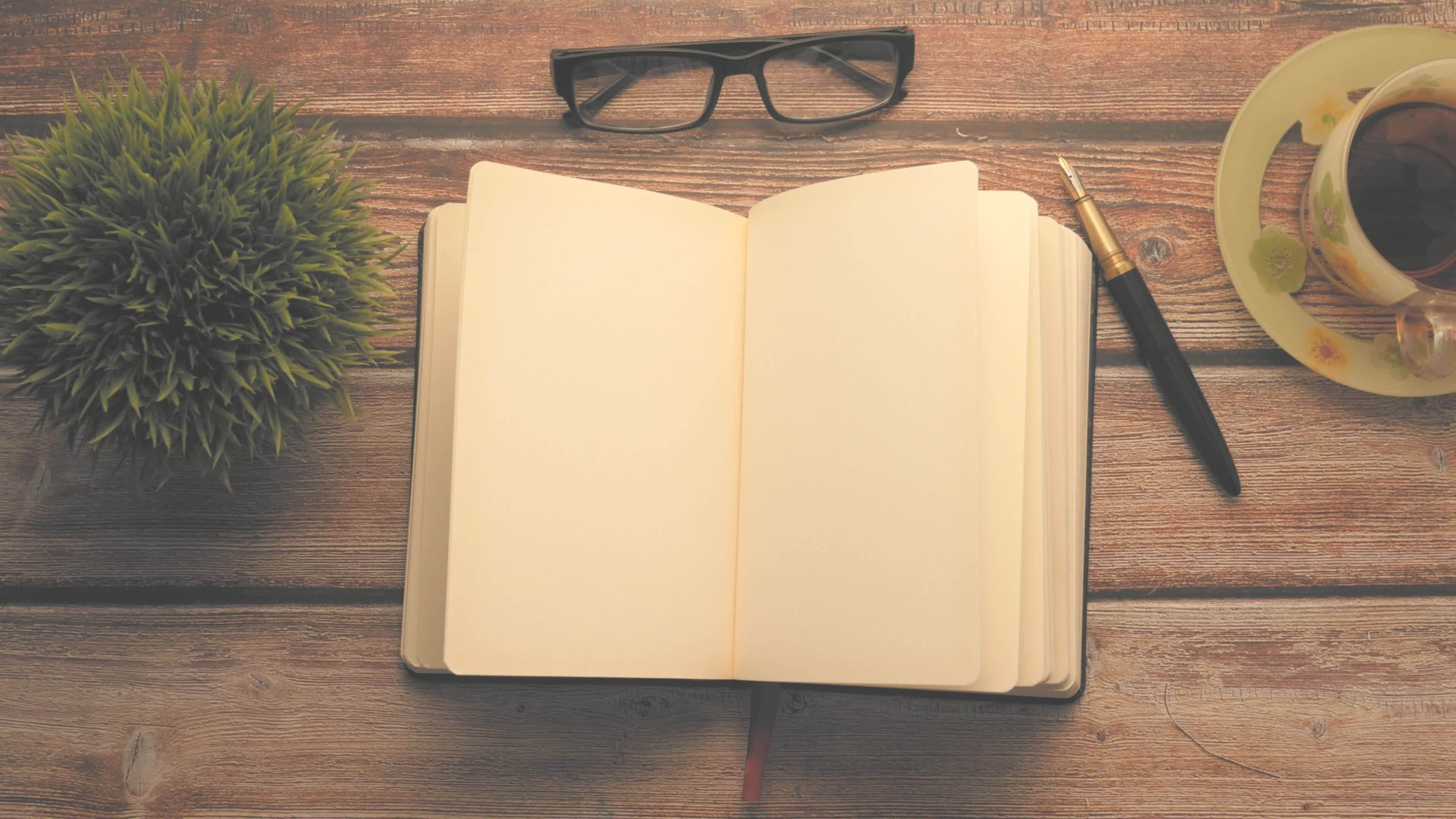 High angle view of open diary on table 22821063 Stock Video at Vecteezy