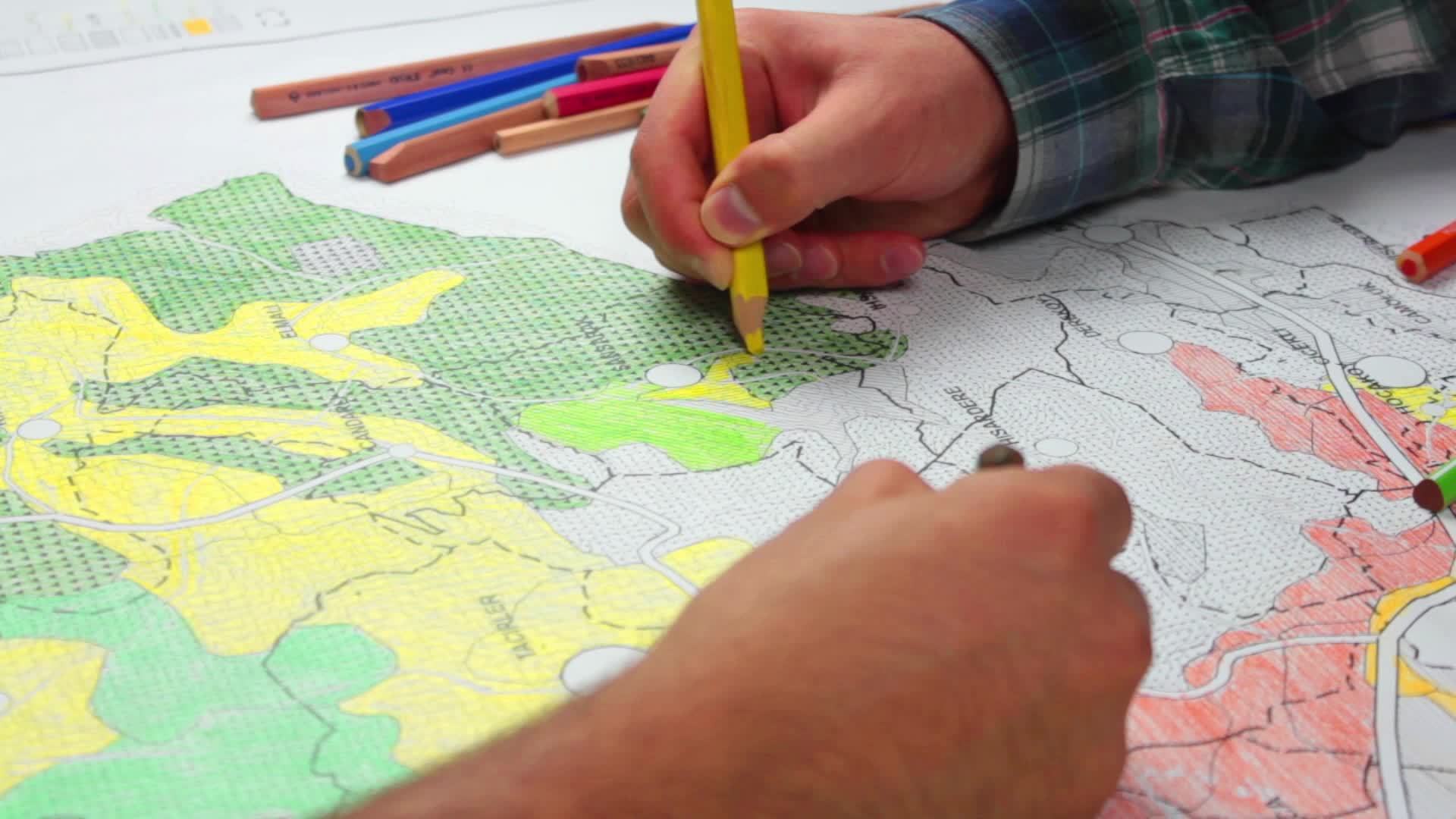 Students making maps for city planning and students coloring the map ... Students making maps for city planning and students coloring the map ...