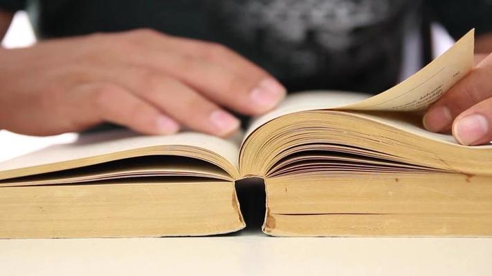 Book Pages Flipping Stock Video Footage for Free Download