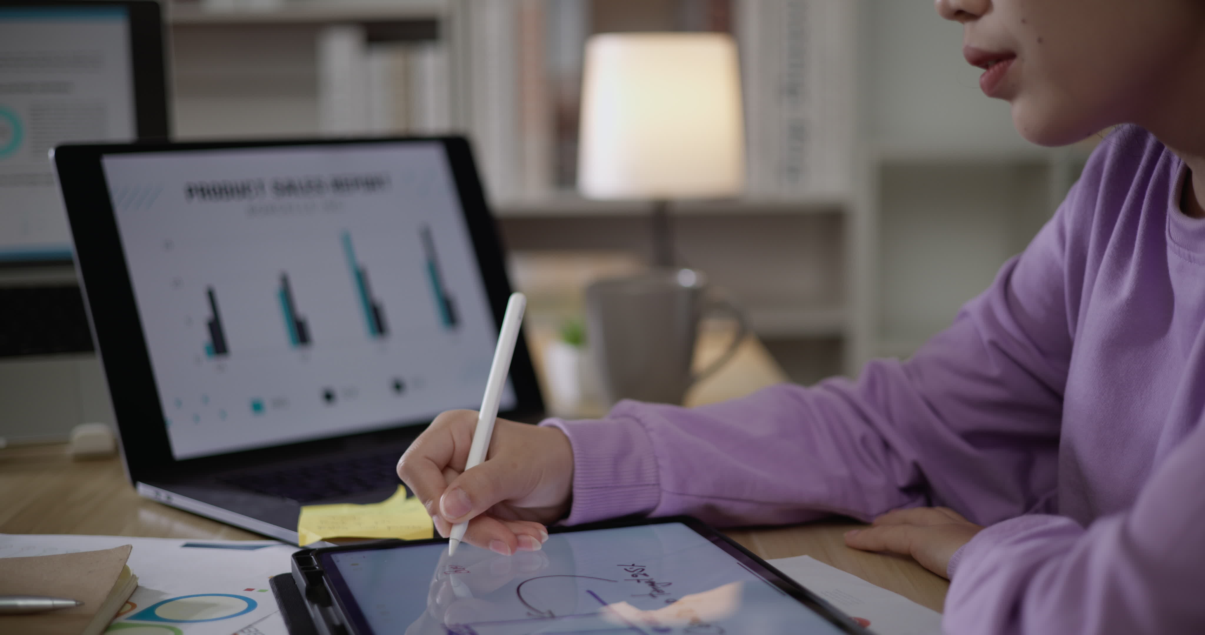 Footage of young Asian woman, freelance data scientist work remotely at ...