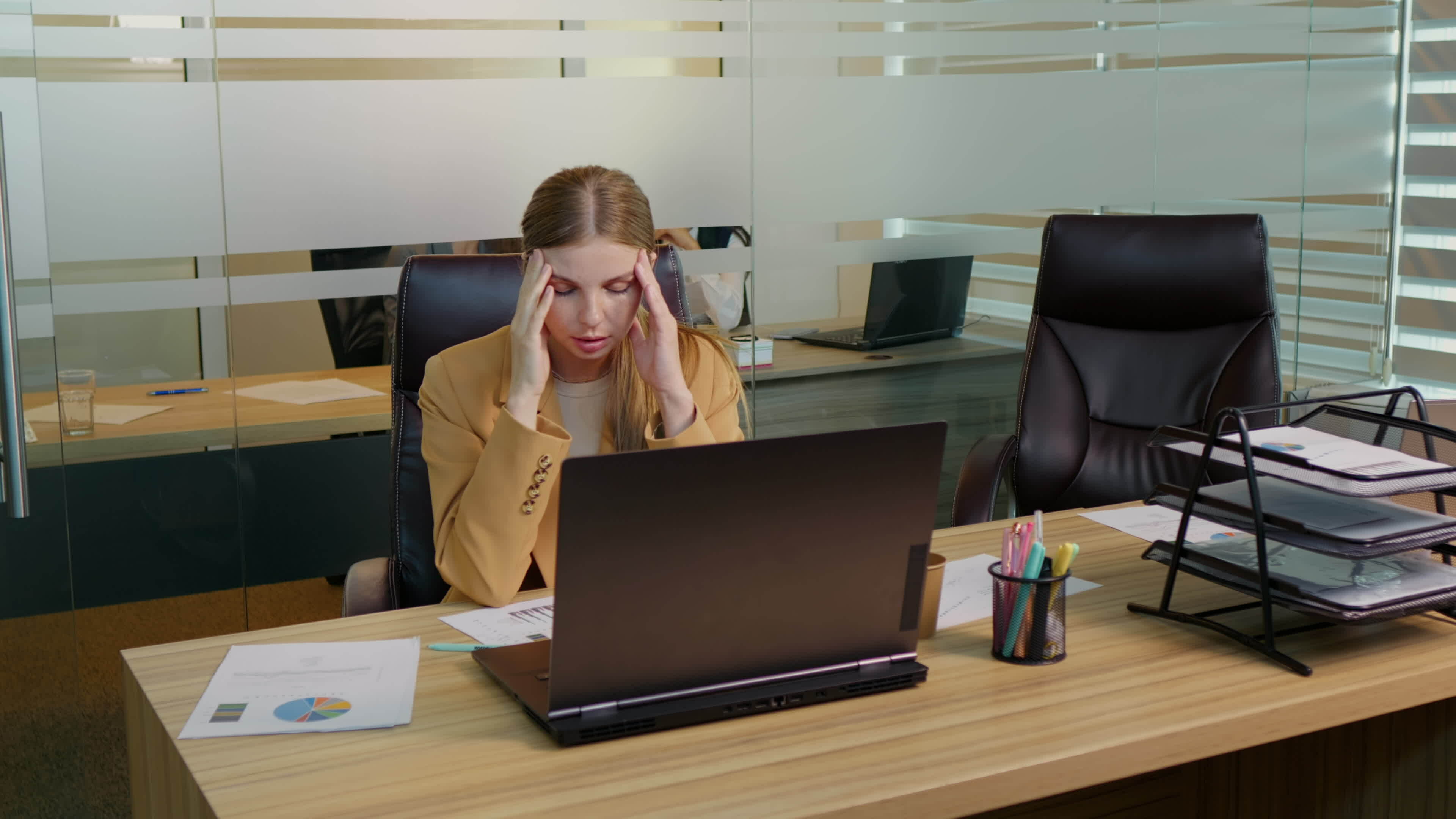 Working businesswoman massaging temples, feeling exhausted. 23572941 ... Working businesswoman massaging temples, feeling exhausted. 23572941 ...