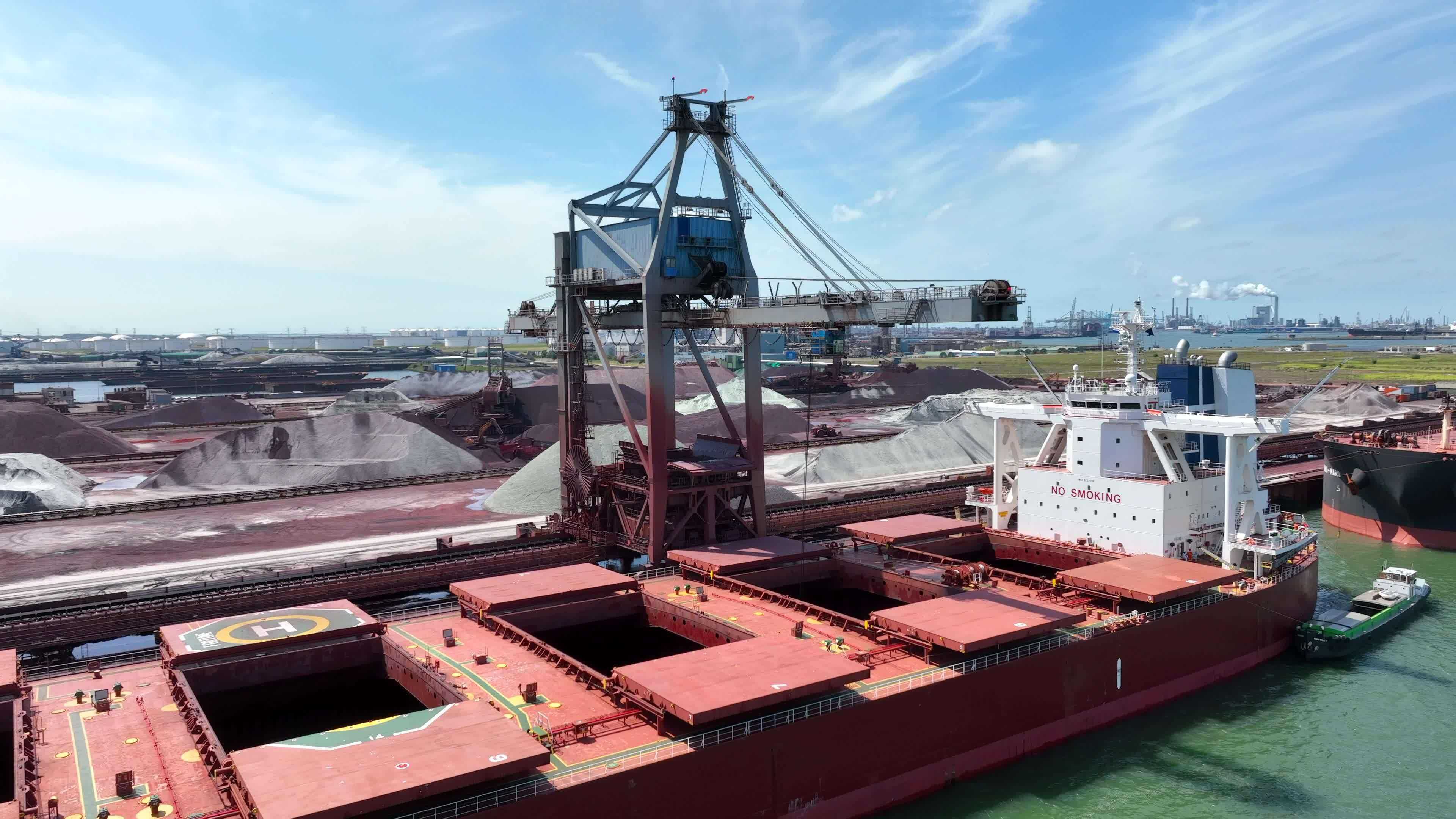 Cranes Unloading a Bulk Carrier Ship at Port 23587035 Stock Video at Vecteezy
