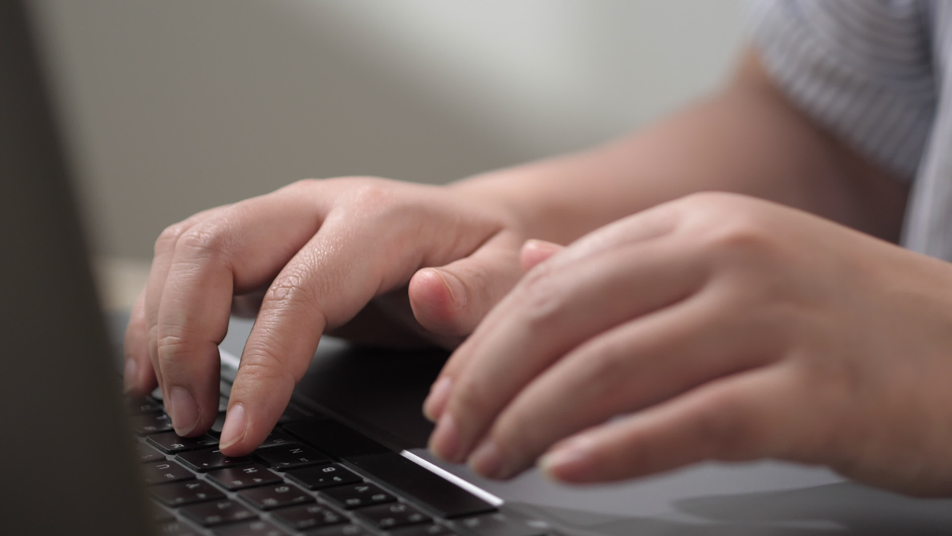 Close up hands Asian businesswoman, freelance data scientist work remotely at home coding ...