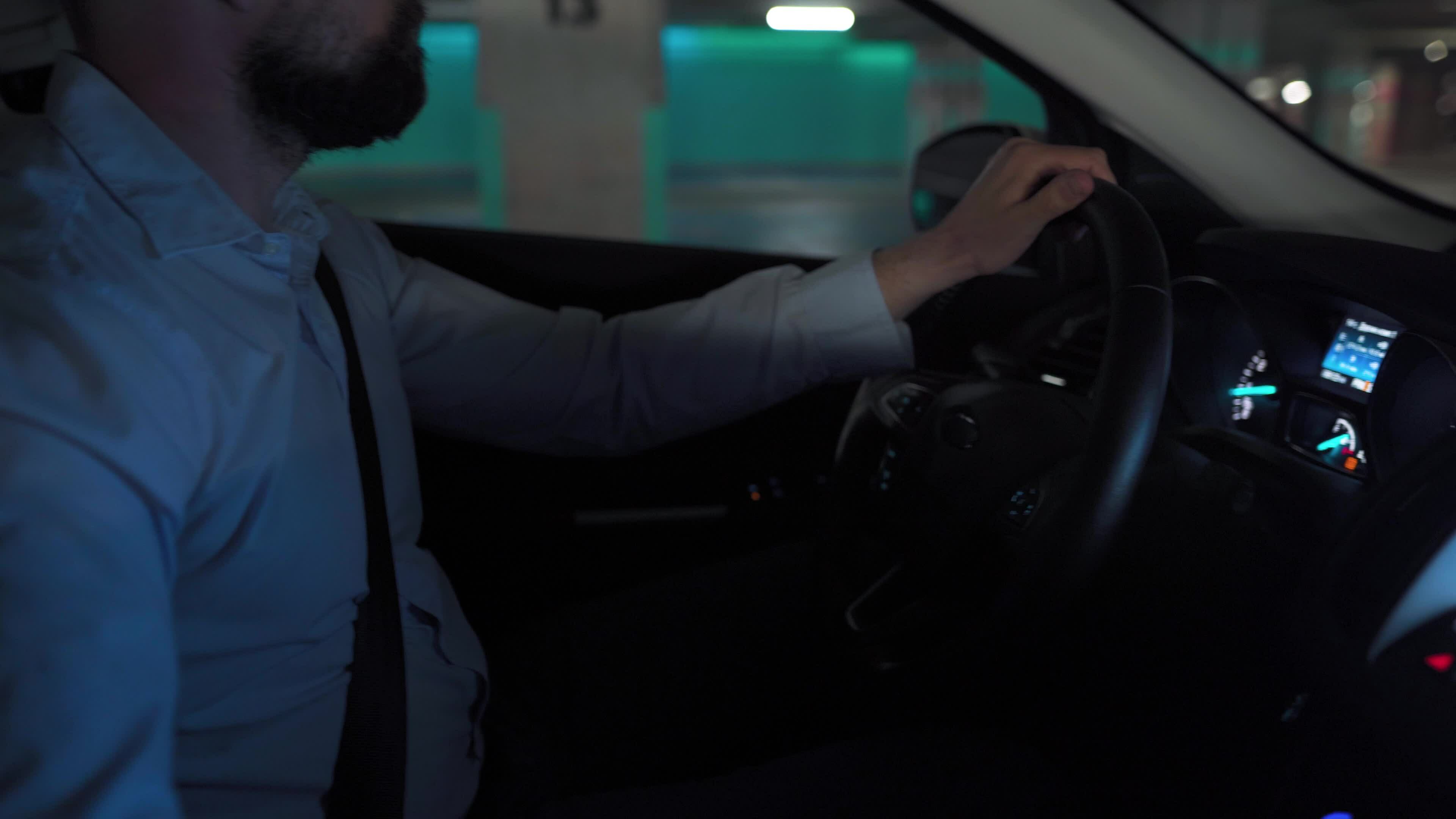 Man driving in innovative automated car using self-parking autopilot ... Man driving in innovative automated car using self-parking autopilot ...